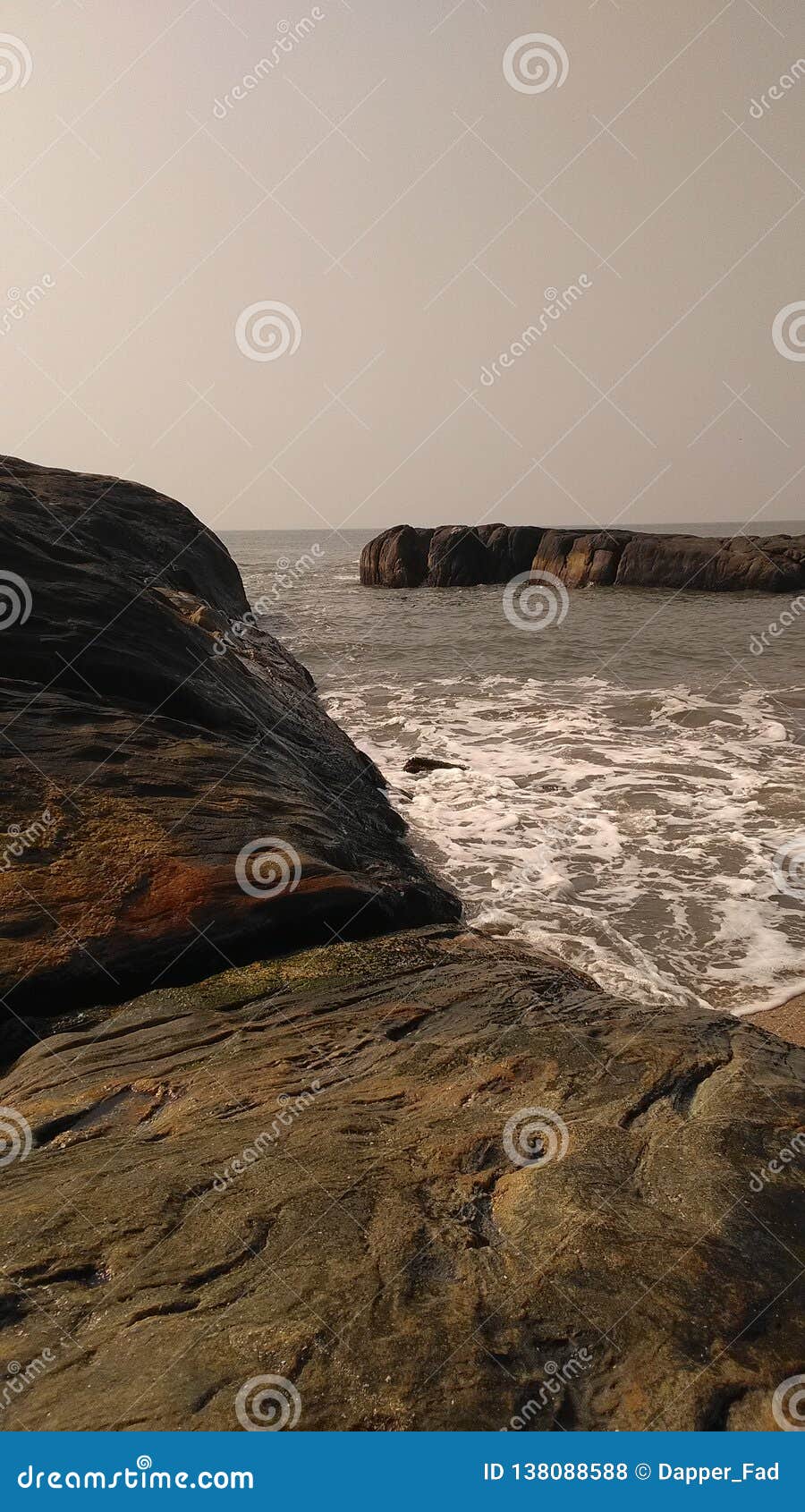 Seashore on rock side stock photo. Image of seascape - 138088588