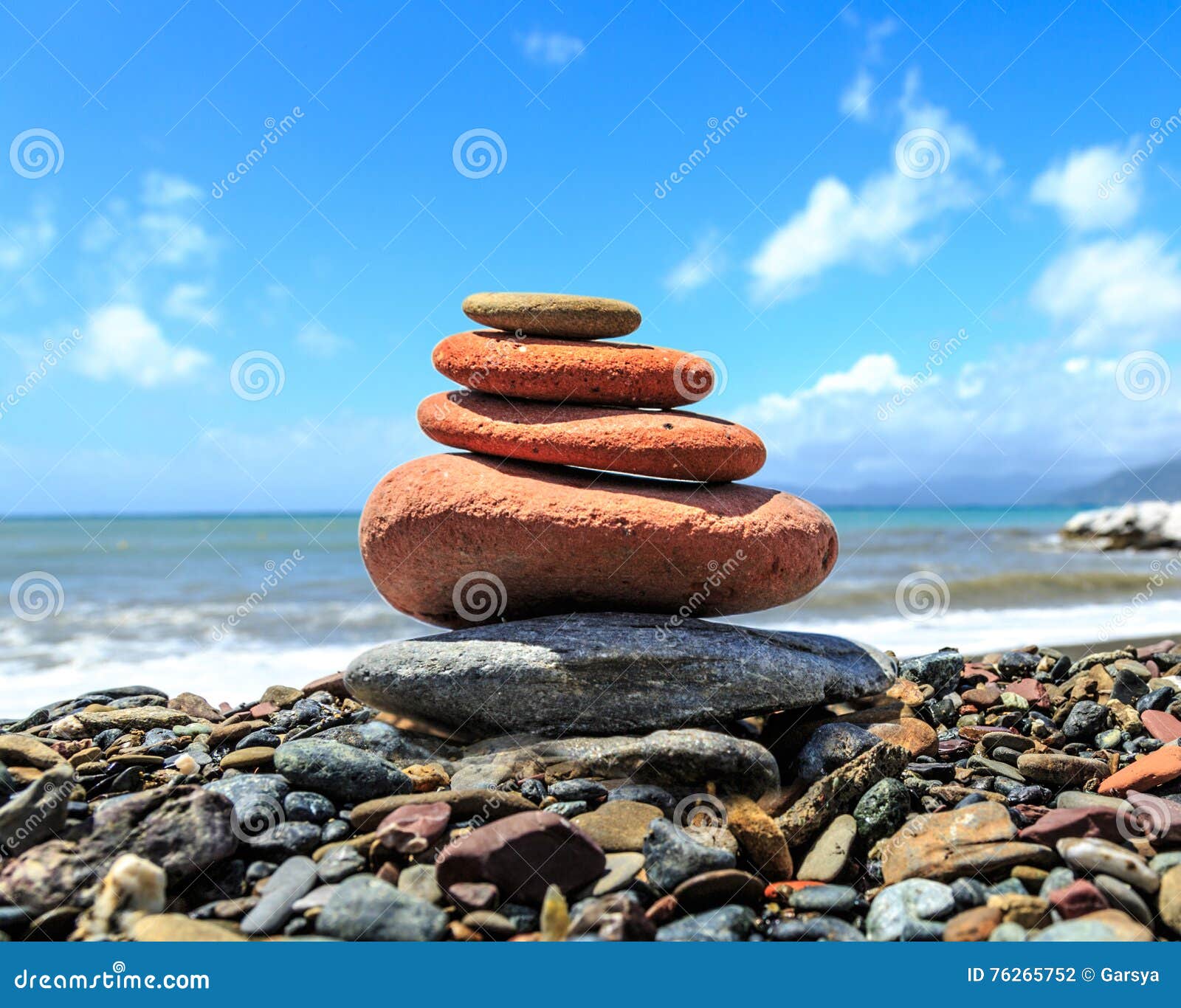 Seashore with Stone Construction on Blue Sky Background Stock Photo ...