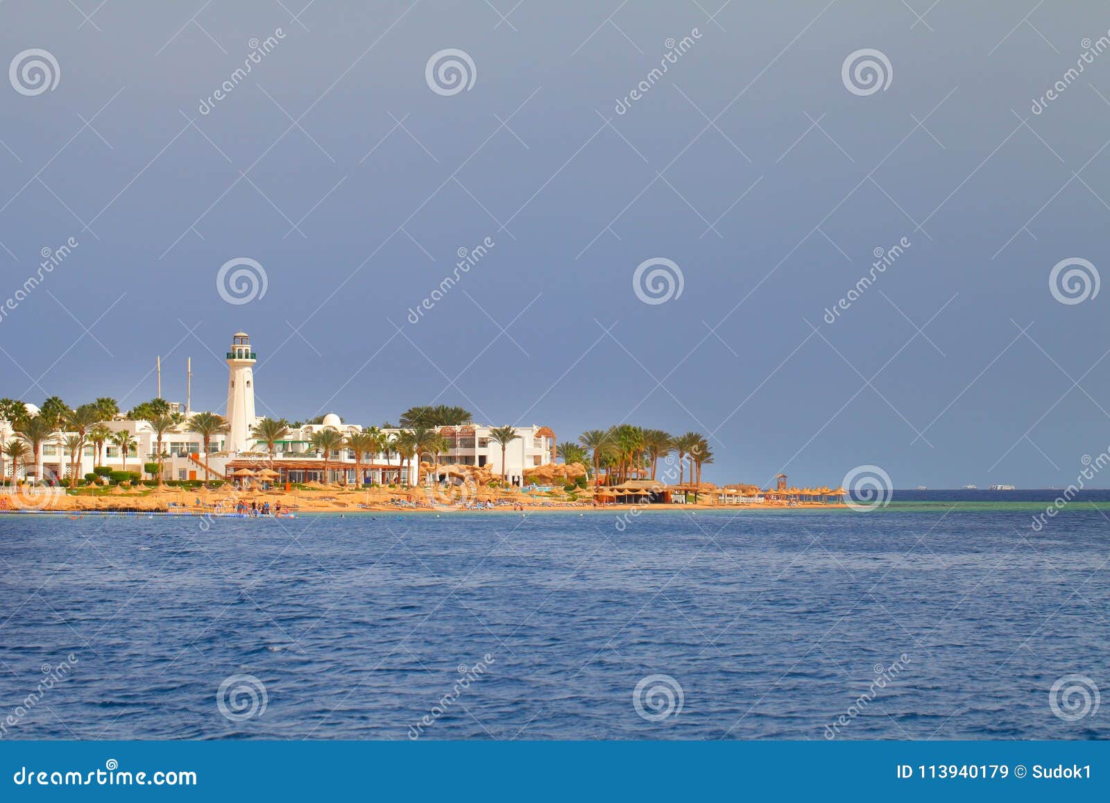 Seashore View with Building and Small Tower on the Beach Stock Image ...