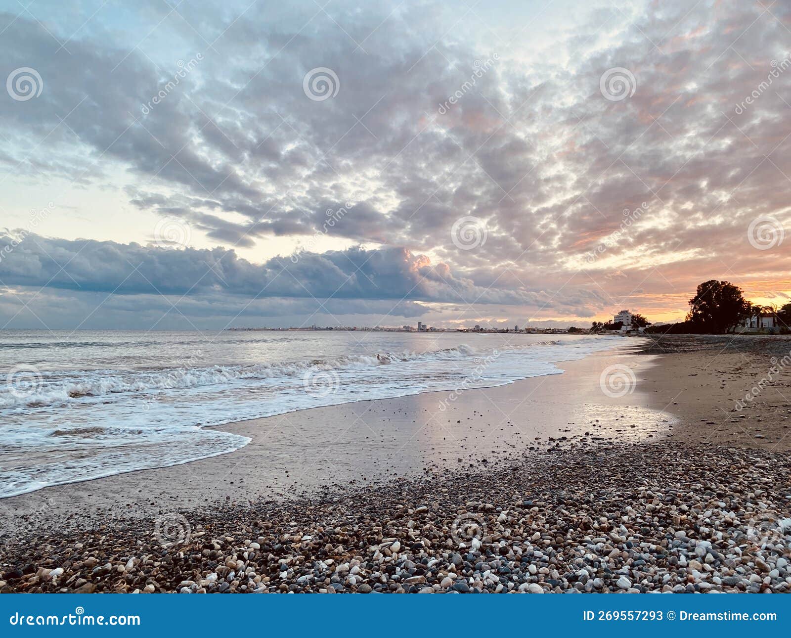 Seaside Pebble Beach Sunset Stock Image - Image of ocean, couple: 269557293