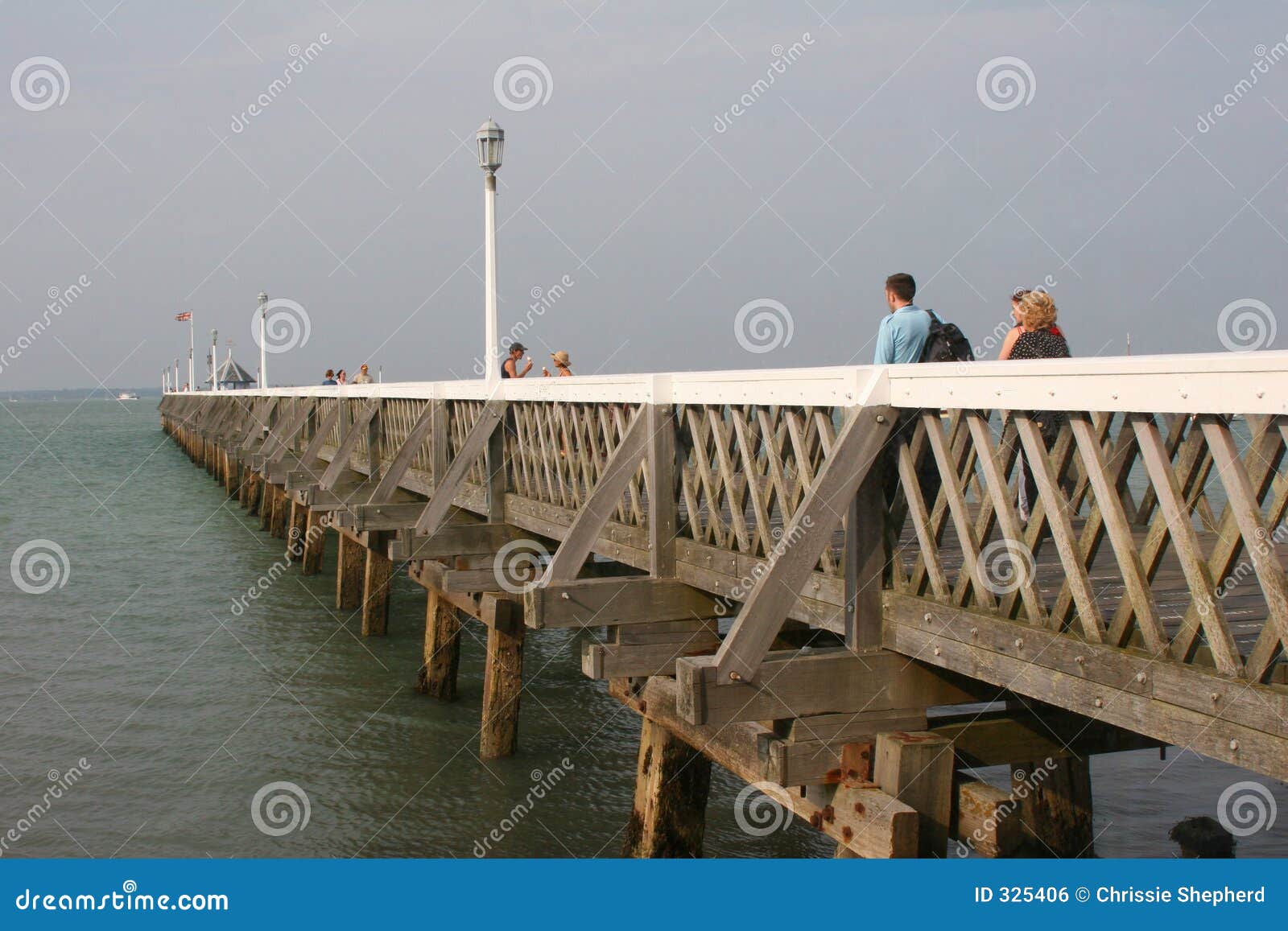 Seaside pier with people stock photo. Image of people, woman - 325406