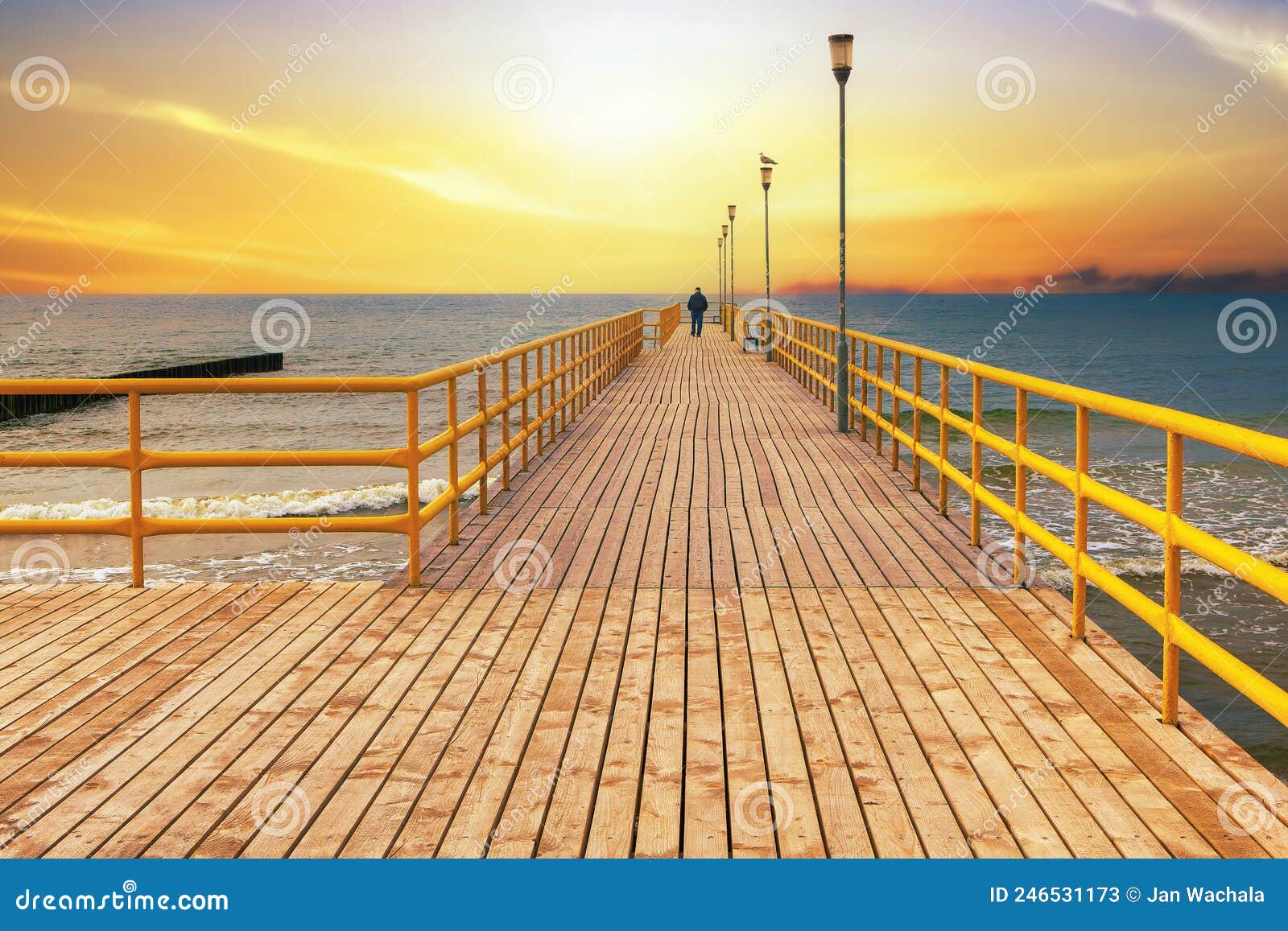 The seaside pier at sunset stock image. Image of summer - 246531173