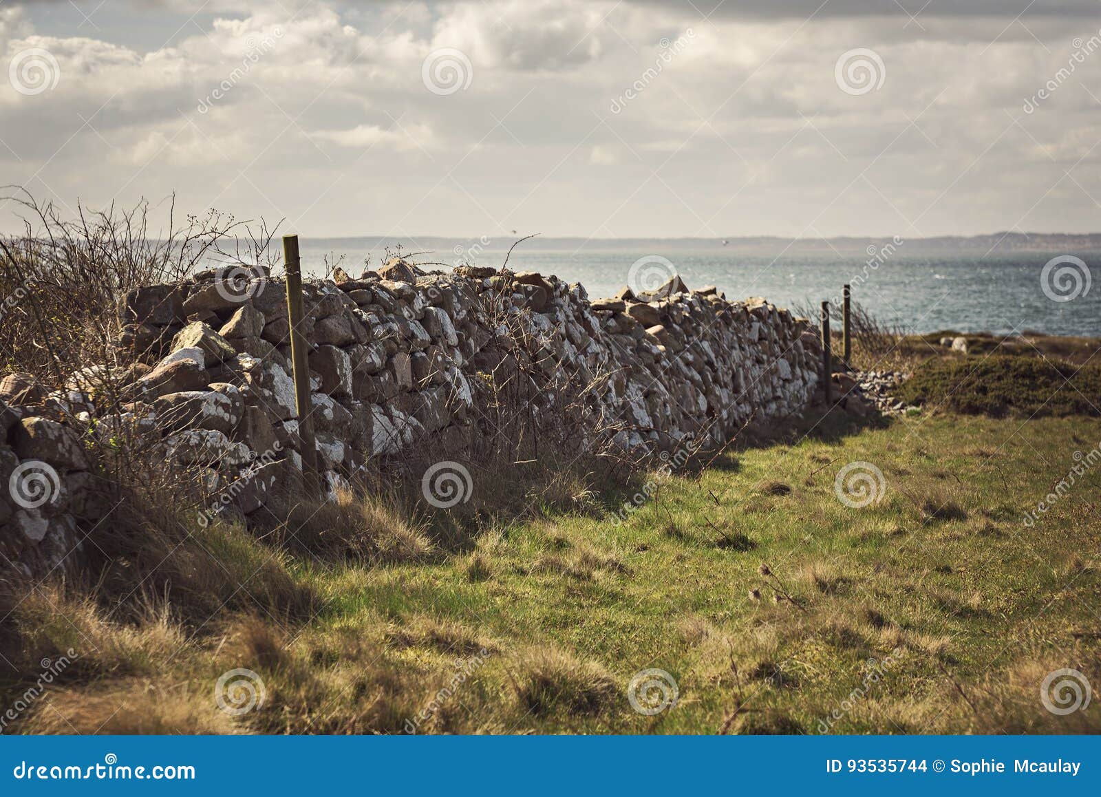 Seaside stone wall stock photo. Image of block, landscape - 93535744