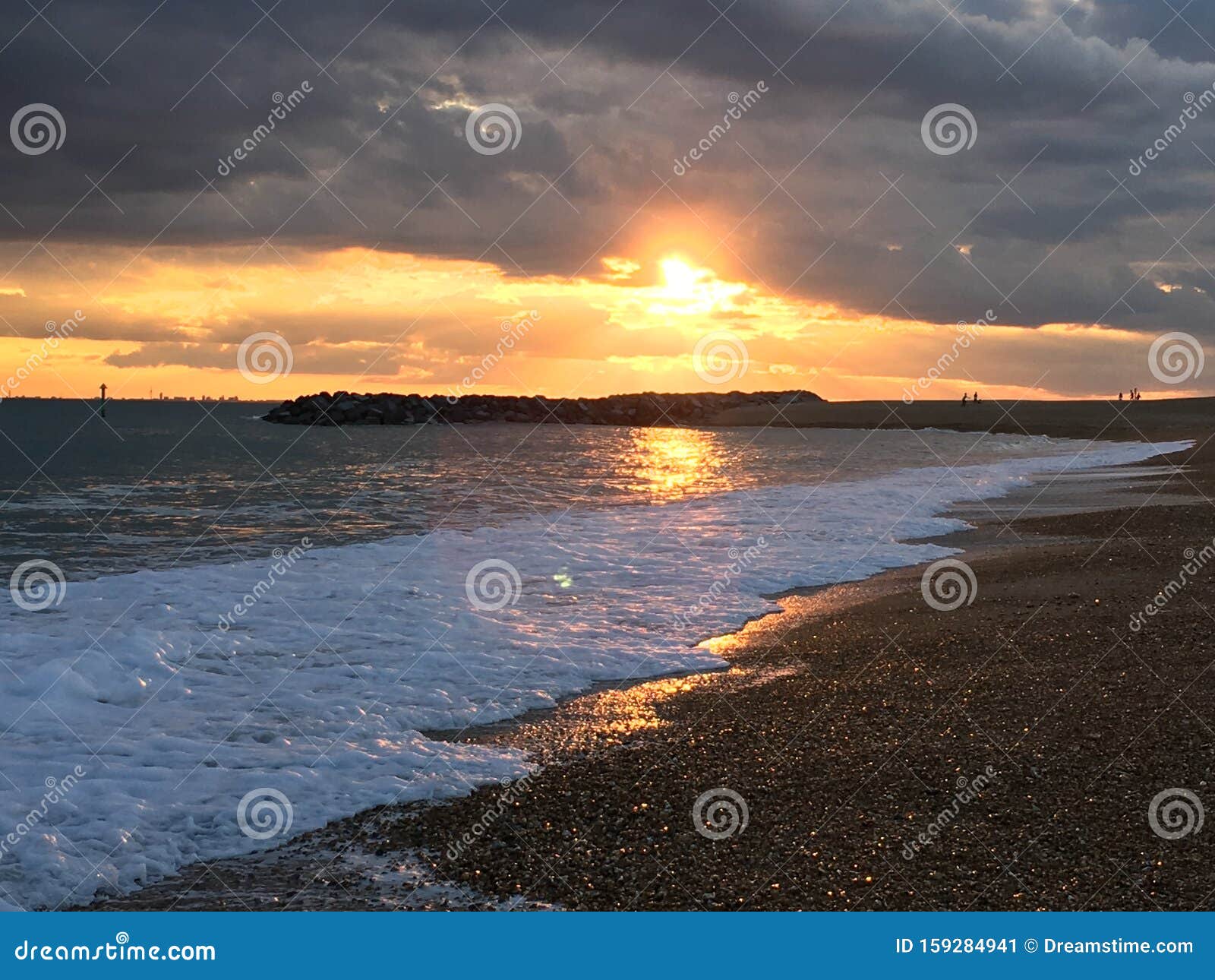 Seaside sunset stock image. Image of setting, sunset - 159284941