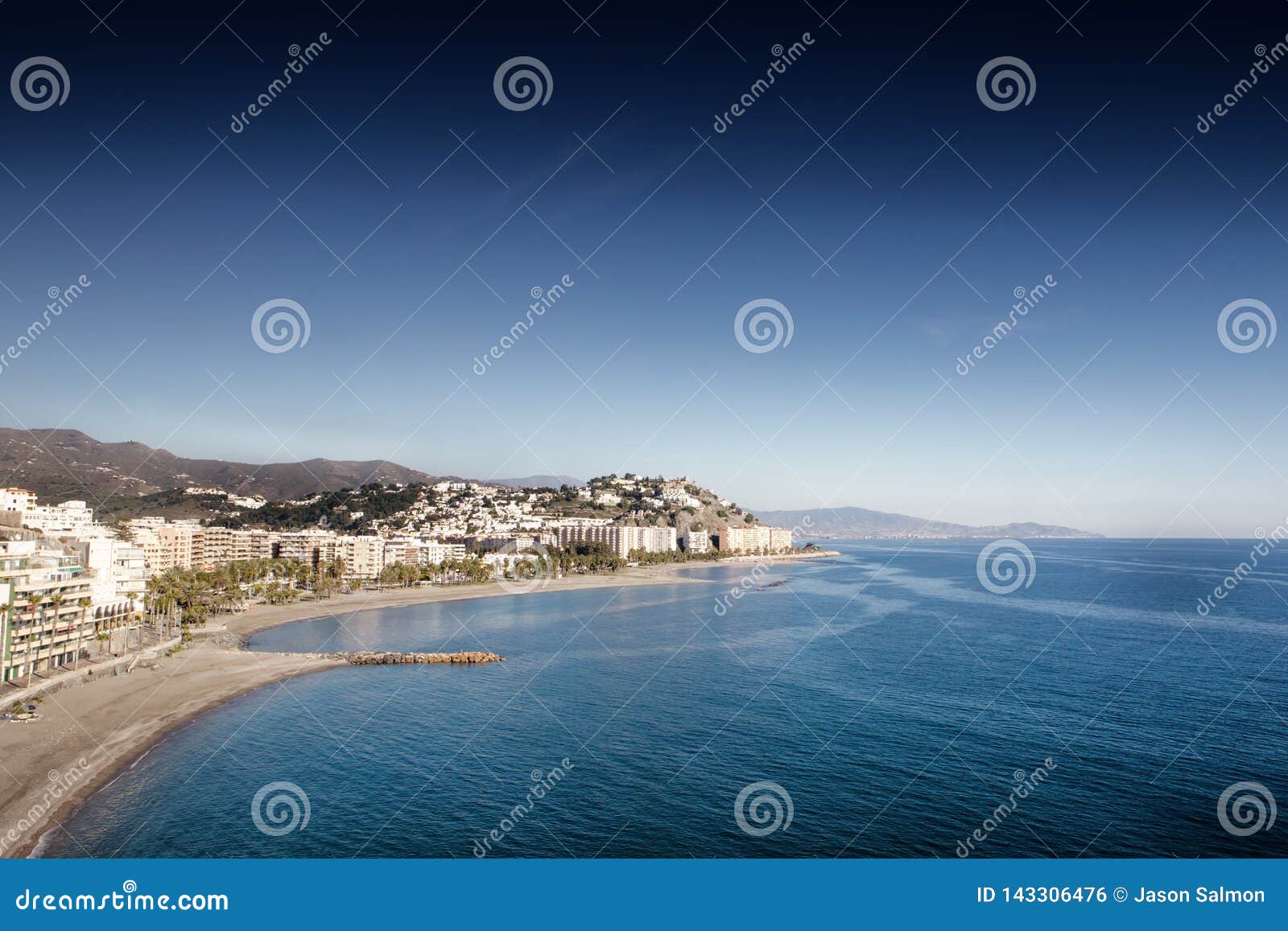 Seaside town of almunecar stock photo. Image of mountains - 143306476