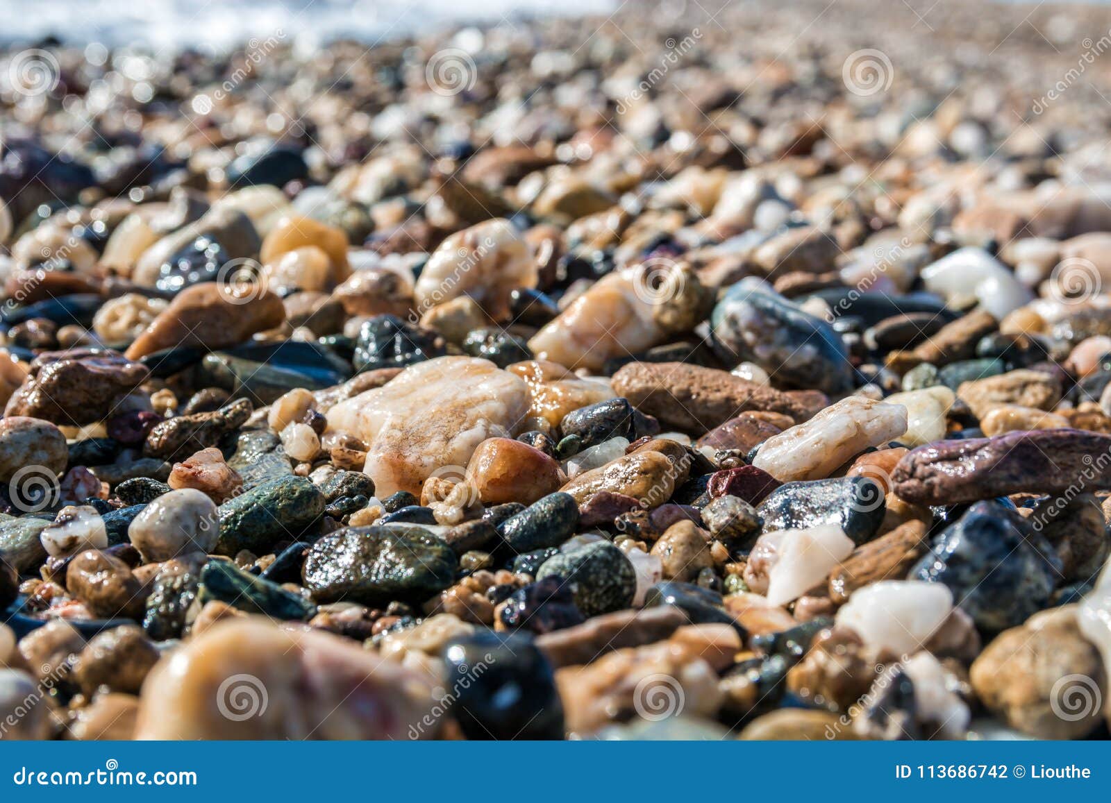 Seaside waves pebble stock photo. Image of greece, colorful - 113686742