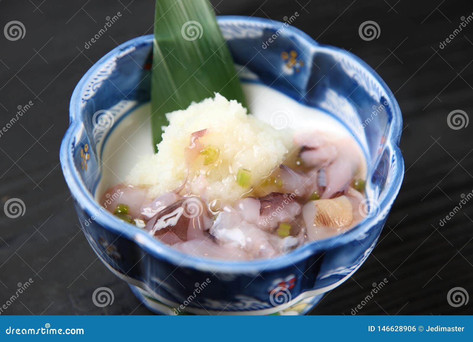 Seasoned Octopus with Wasabi on a Dining Table Stock Photo - Image of ...