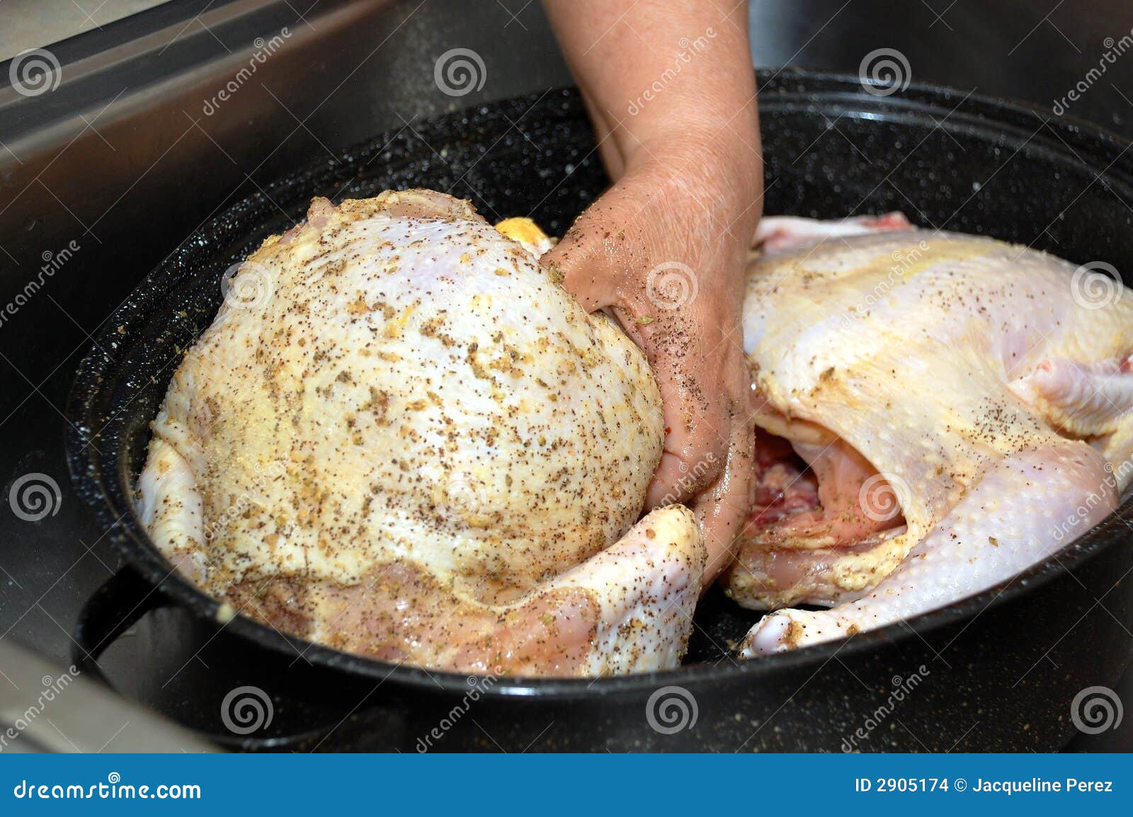 Seasoning Raw Whole Chicken Stock Photo - Image of powder, removing ...