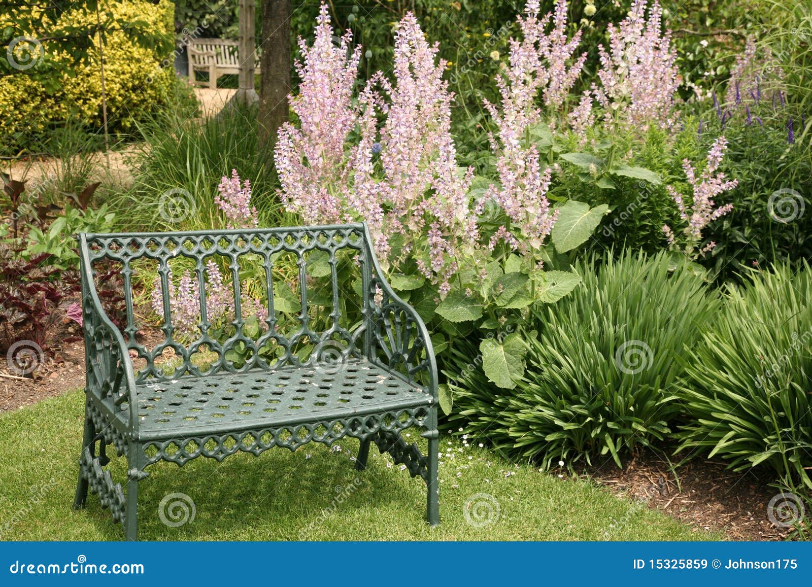 Seat Amongst the Flowers stock image. Image of seating - 15325859