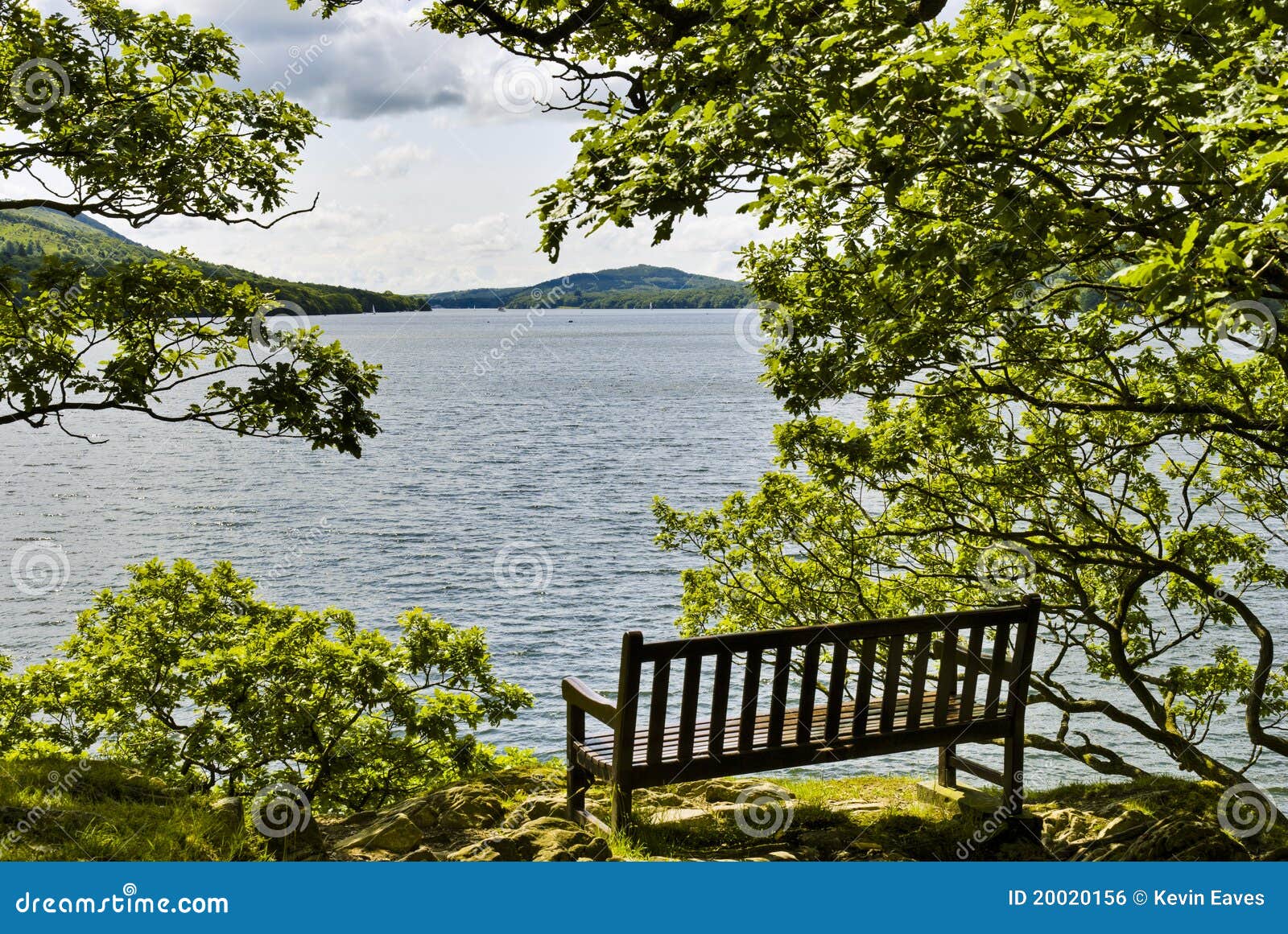 Seat overlooking lake stock photo. Image of district - 20020156