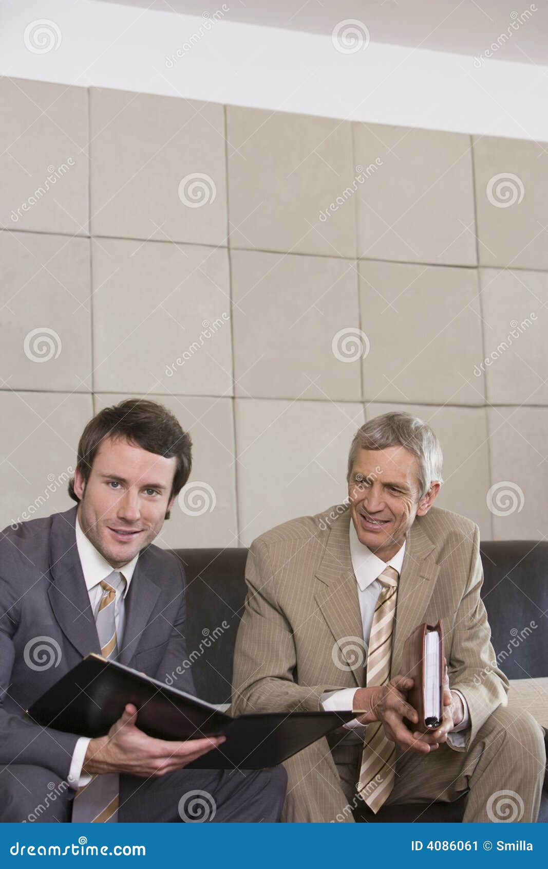 Seated businessmen stock image. Image of cheerful, positive - 4086061