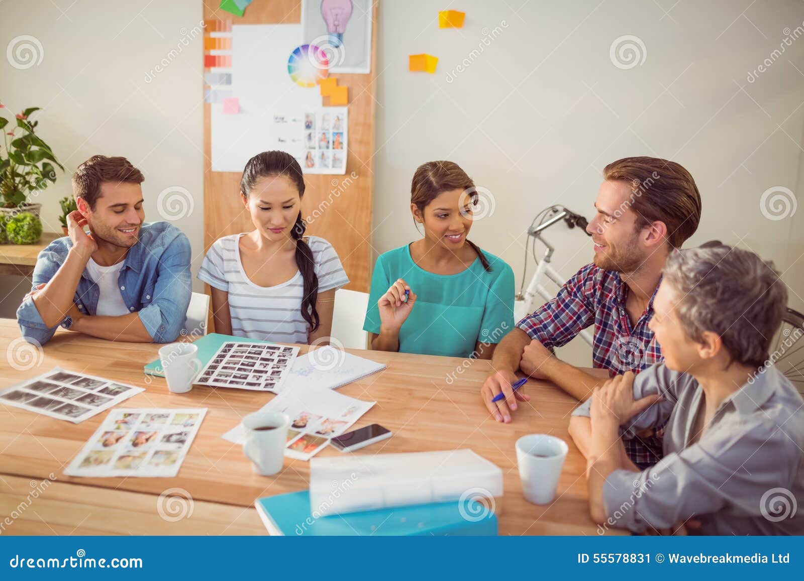 Seated Creative Business Team Working Together Stock Image - Image of ...