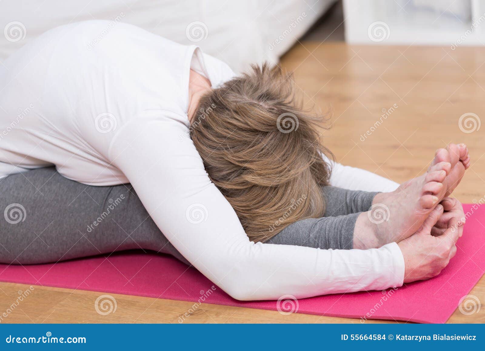 Seated forward bend stock photo. Image of flexibility - 55664584