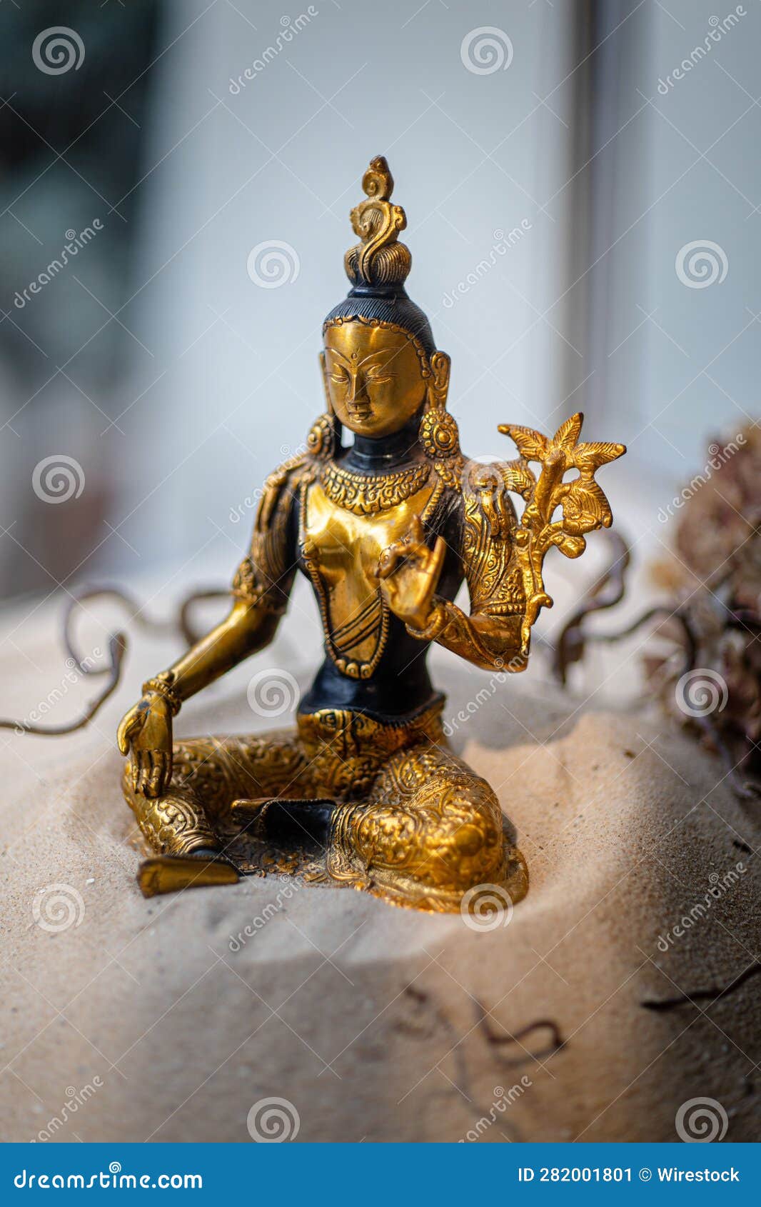 Seated Golden Female Buddha Statue On Sand Stock Image | CartoonDealer ...