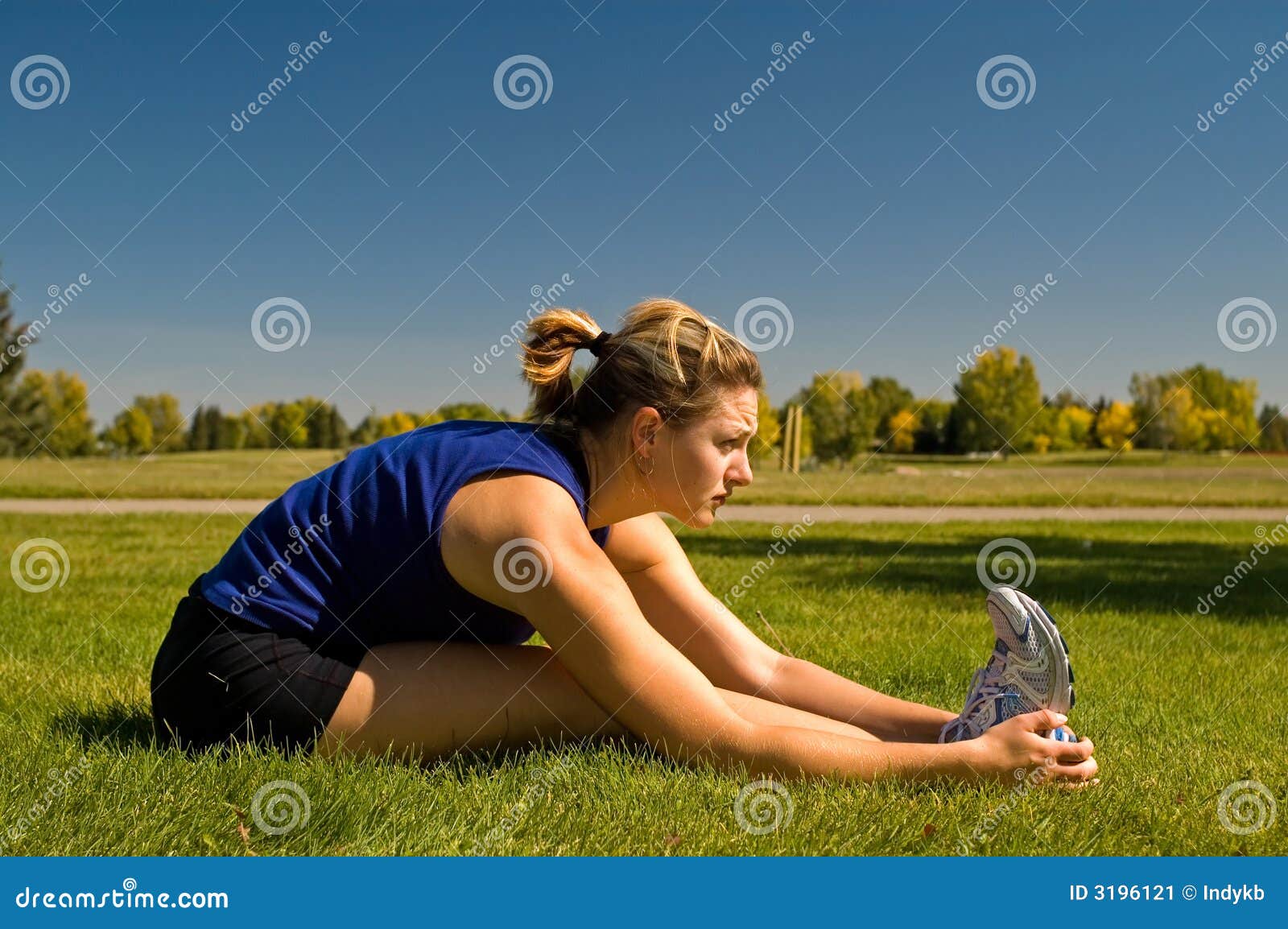 Seated Hamstring Stretch stock image. Image of fitness - 3196121