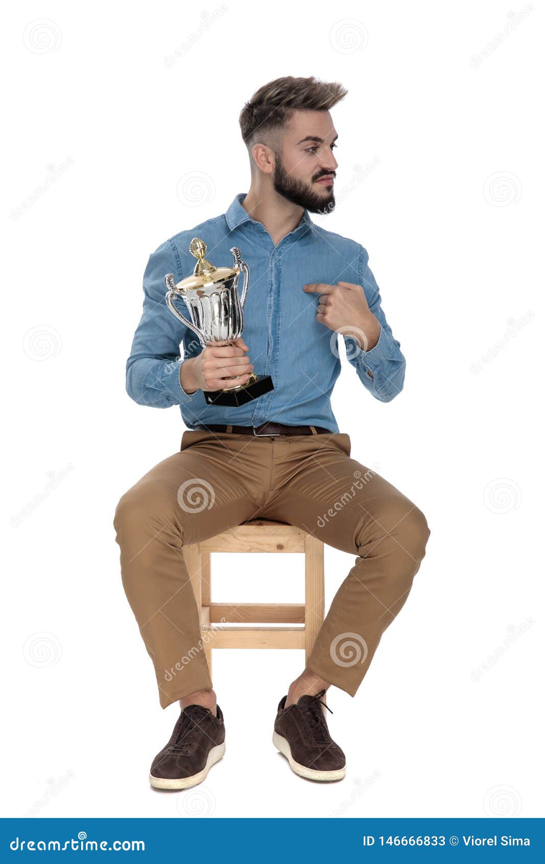 Seated Handsome Man Pointing Himself with Trophy Cup in Hand Stock ... Seated Handsome Man Pointing Himself with Trophy Cup in Hand Stock ...