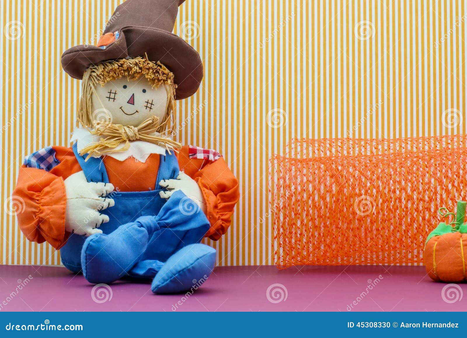 Seated Scarecrow Holding Its Britches Stock Photo - Image of family ...