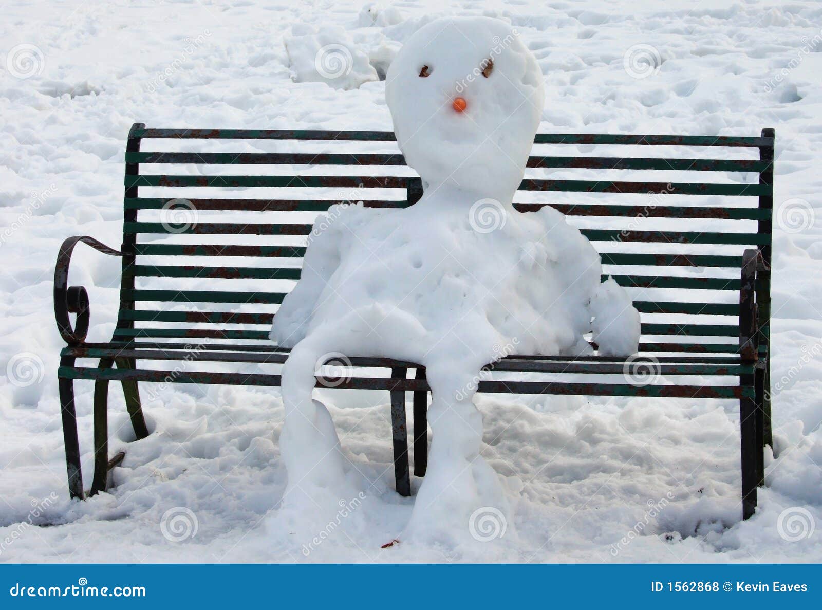 Seated snowman stock photo. Image of thaw, humorous, christmas - 1562868