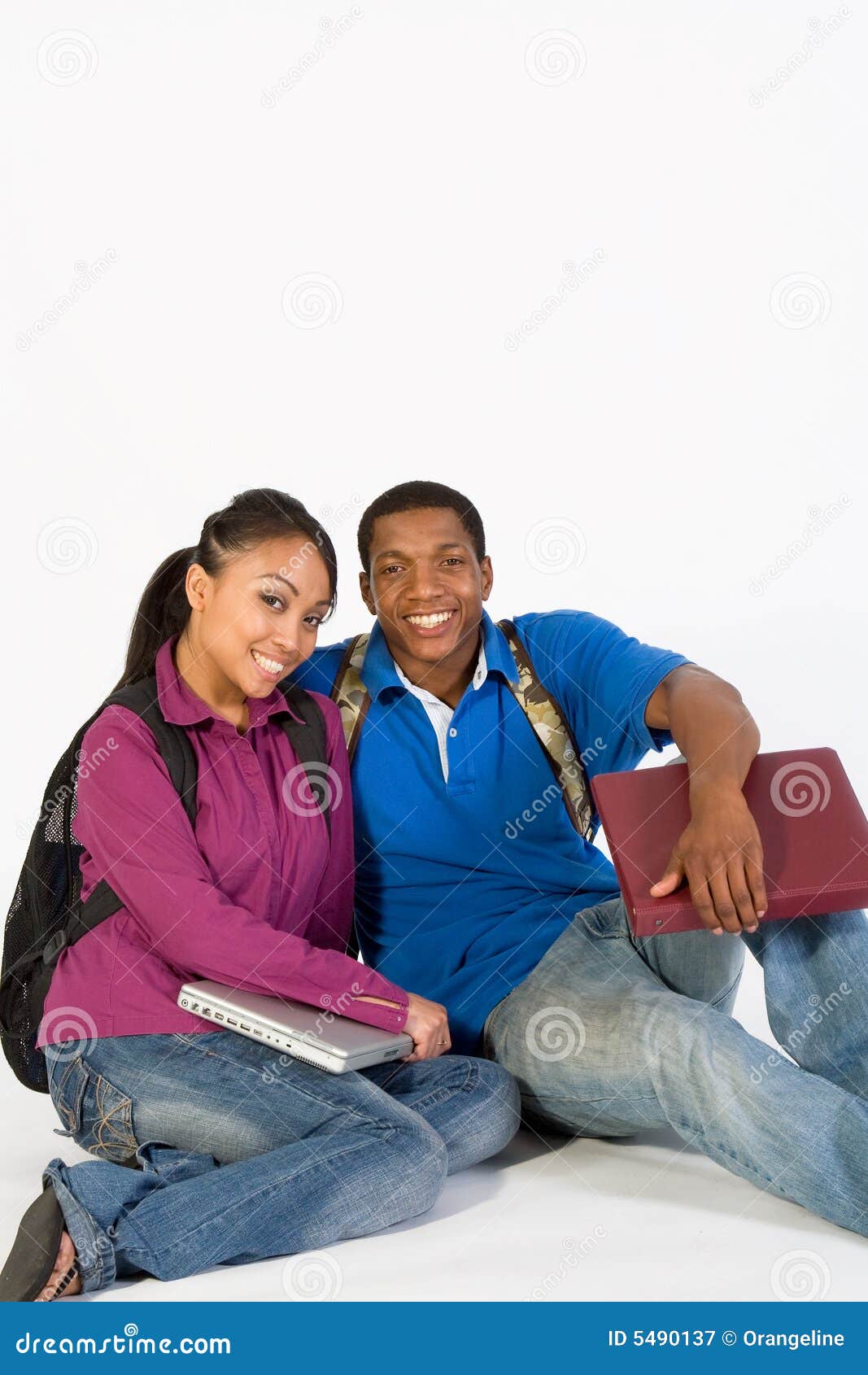 Seated Students Smile At Each Other- Vertical Stock Photo ...