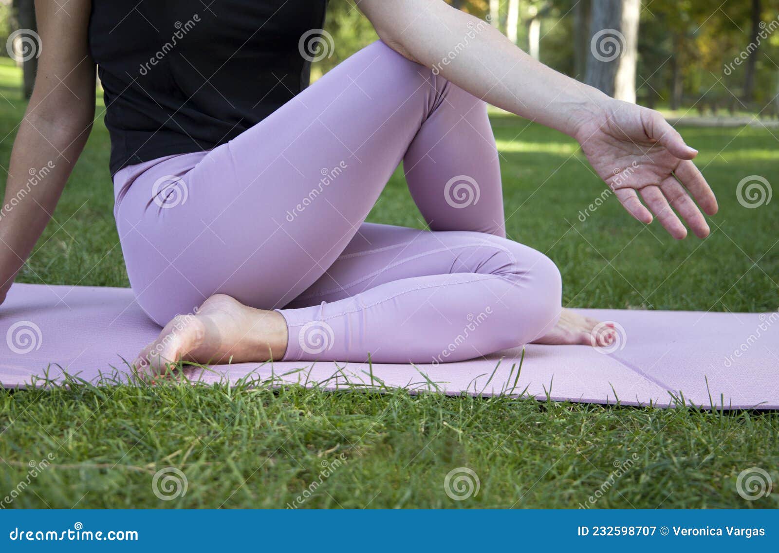 Seated Twist with Bent Knees Stock Image - Image of hand, closeup ...