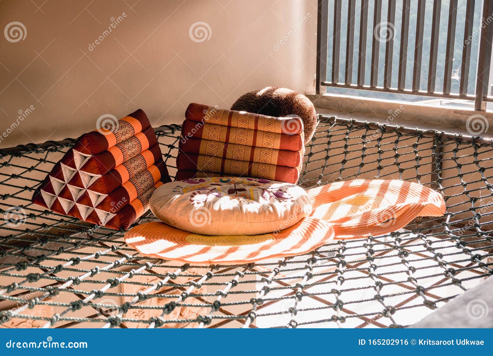 Seating Net with Pillow and Rug Hanging on Second Floor. Stock Photo ...