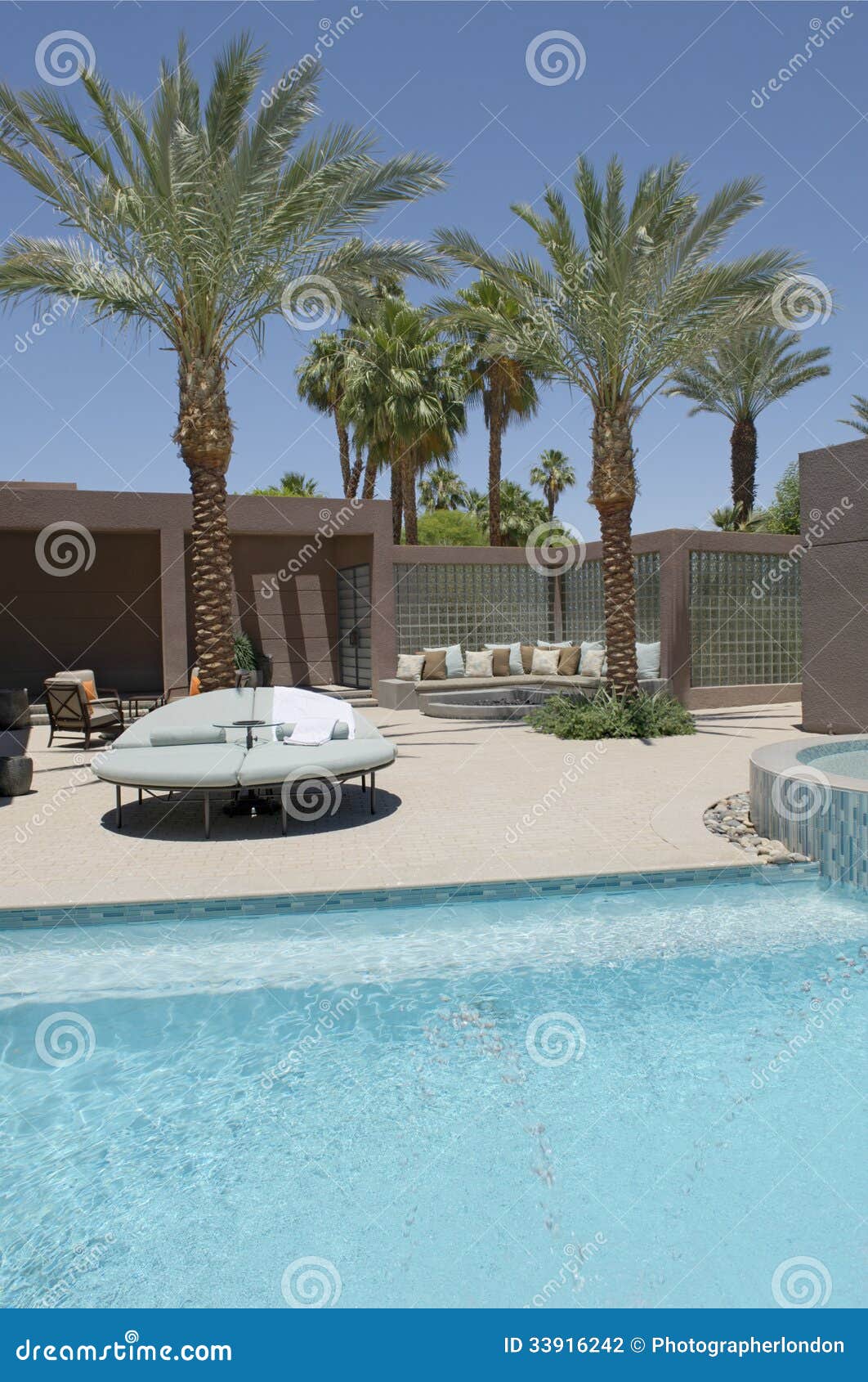 Seating with Palm Trees on Poolside of Home Stock Photo - Image of ...