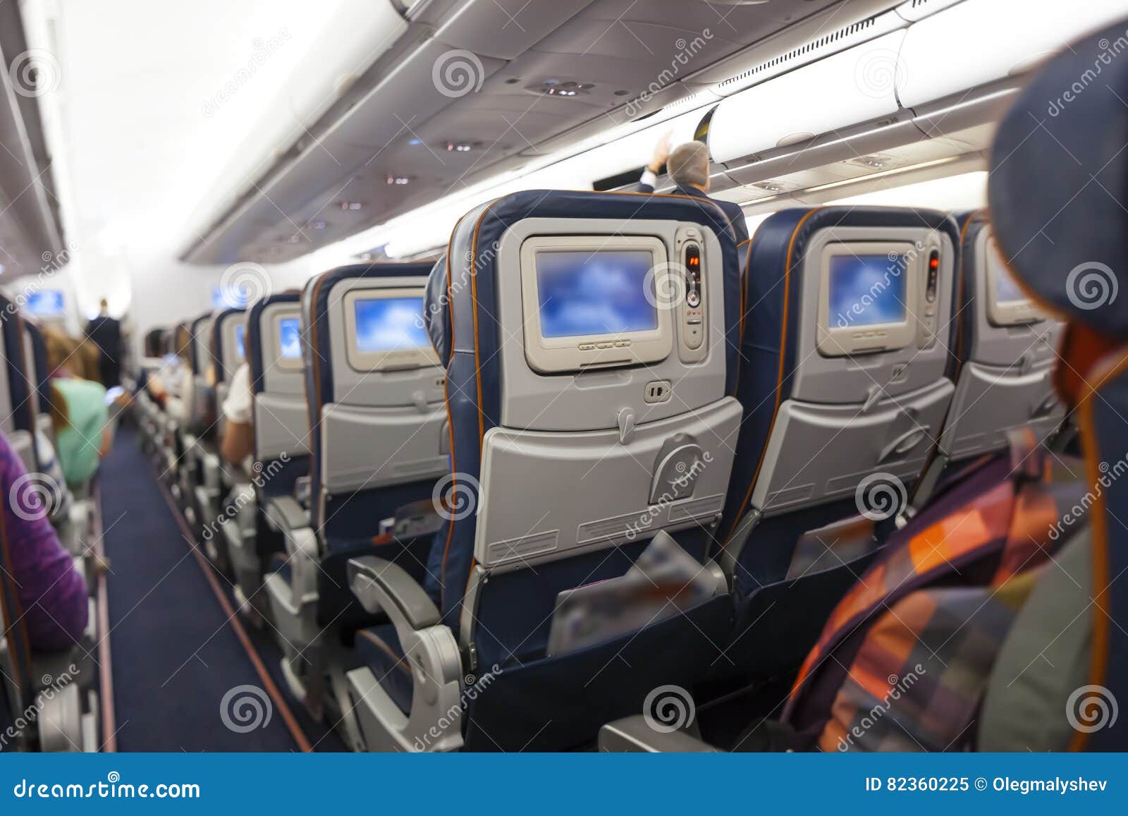 Seating Space with Multimedia Screens Economy Class Airplane Cabin ...