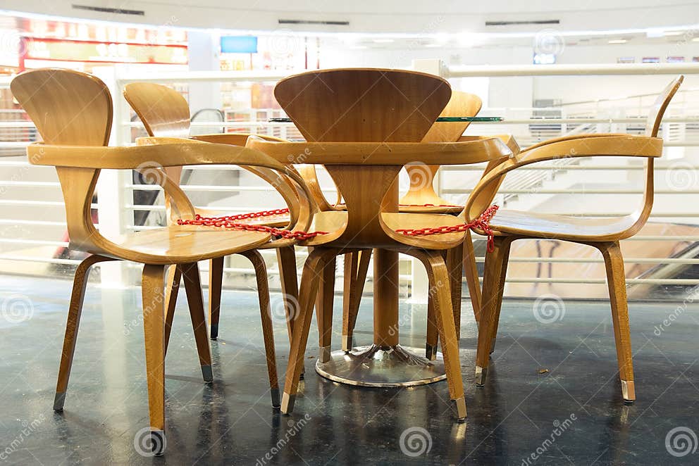 Seats chained to a table stock image. Image of back, tether - 54343775