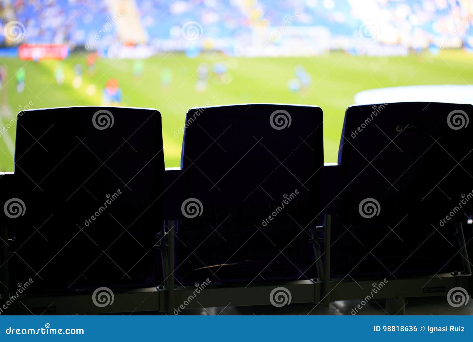 Seats in a soccer stadium stock photo. Image of aisle - 98818636