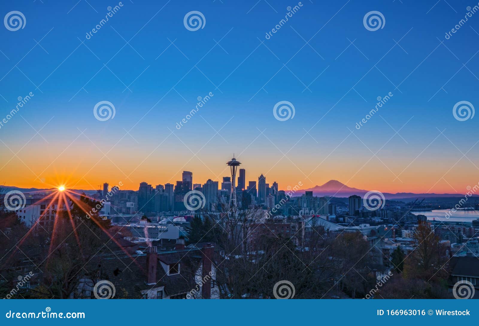 Seattle Sunrise stock photo. Image of buildings, sunflare - 166963016