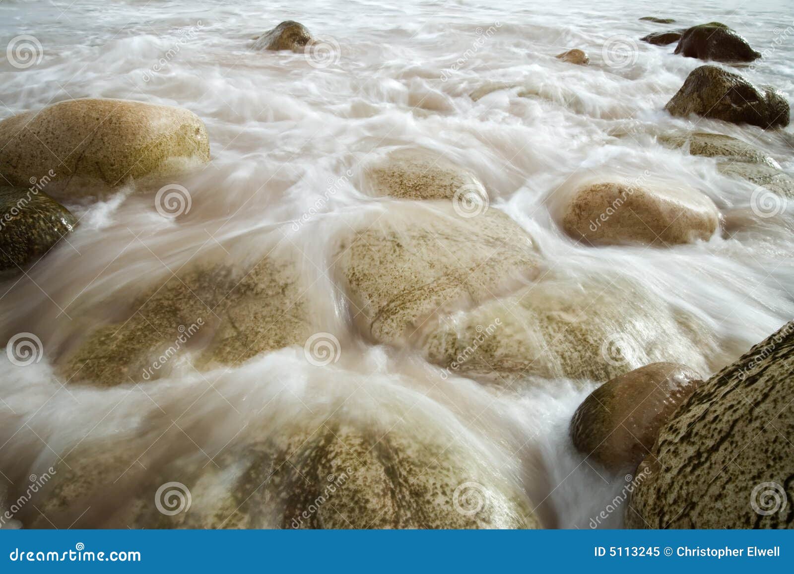 Seawater Flowing Over Rocks Stock Image - Image of misty, tidal: 5113245