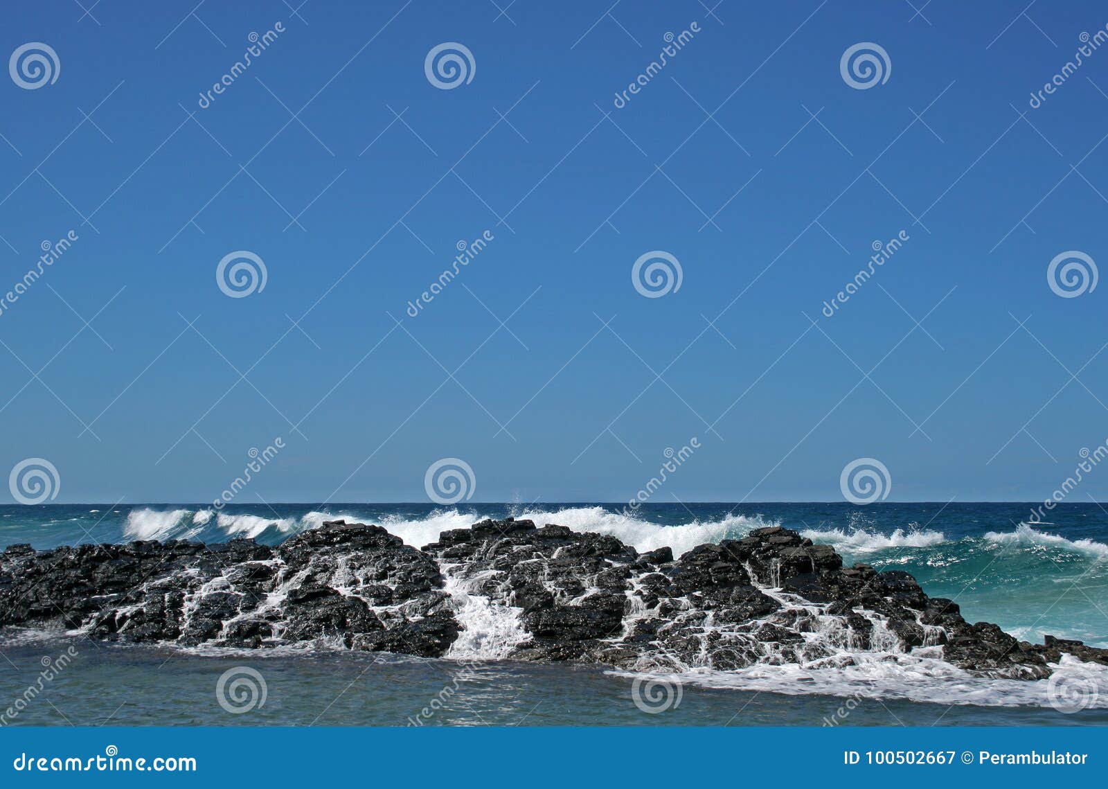 SEAWATER and FOAM RUNNING DOWN ROCKS into TIDAL POOL Stock Image ...