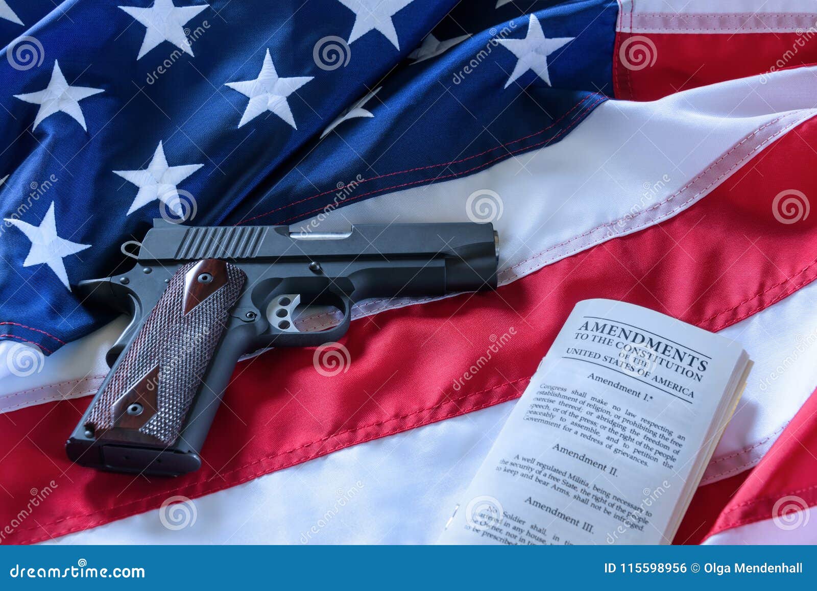 The Second Amendment and Gun Control in the US, Concept. a Handgun and ...