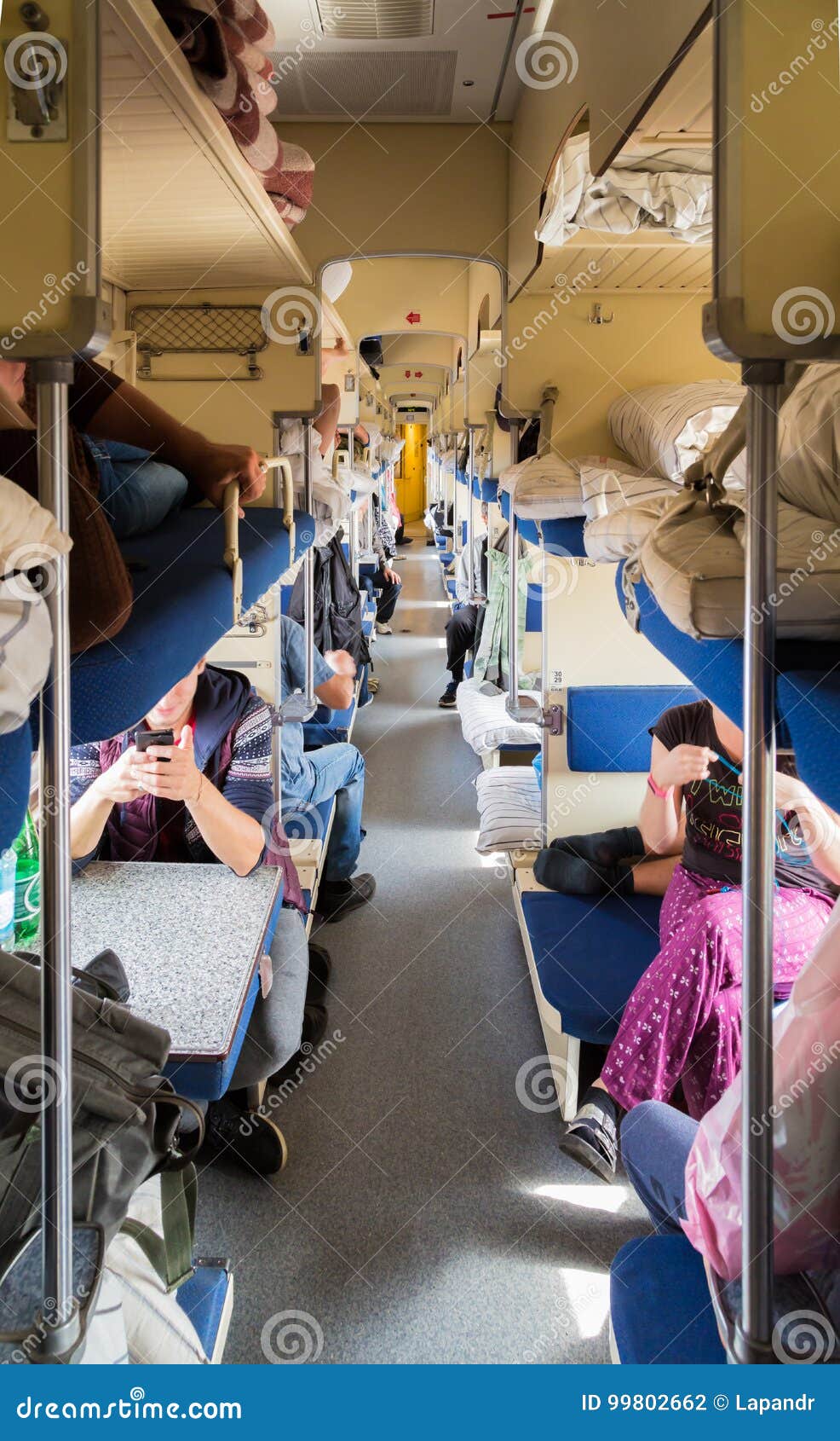 Second-class Carriage with Passengers in the Russian Train. Long ...
