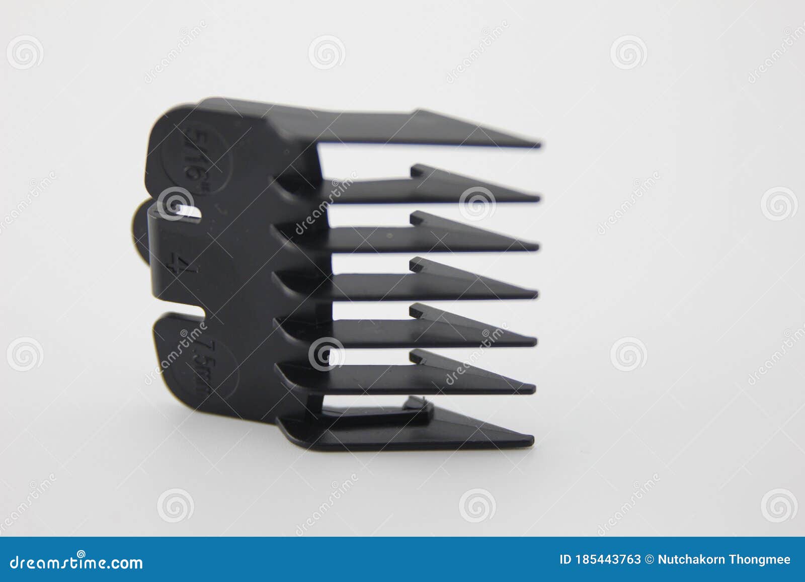 Secondary Teeth for Use with the Clipper Placed on a Gray Background ...