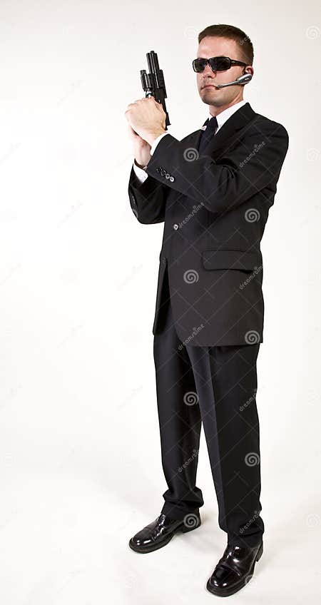 Secret Agent Armed and Dangerous Stock Photo - Image of armed, glasses ...
