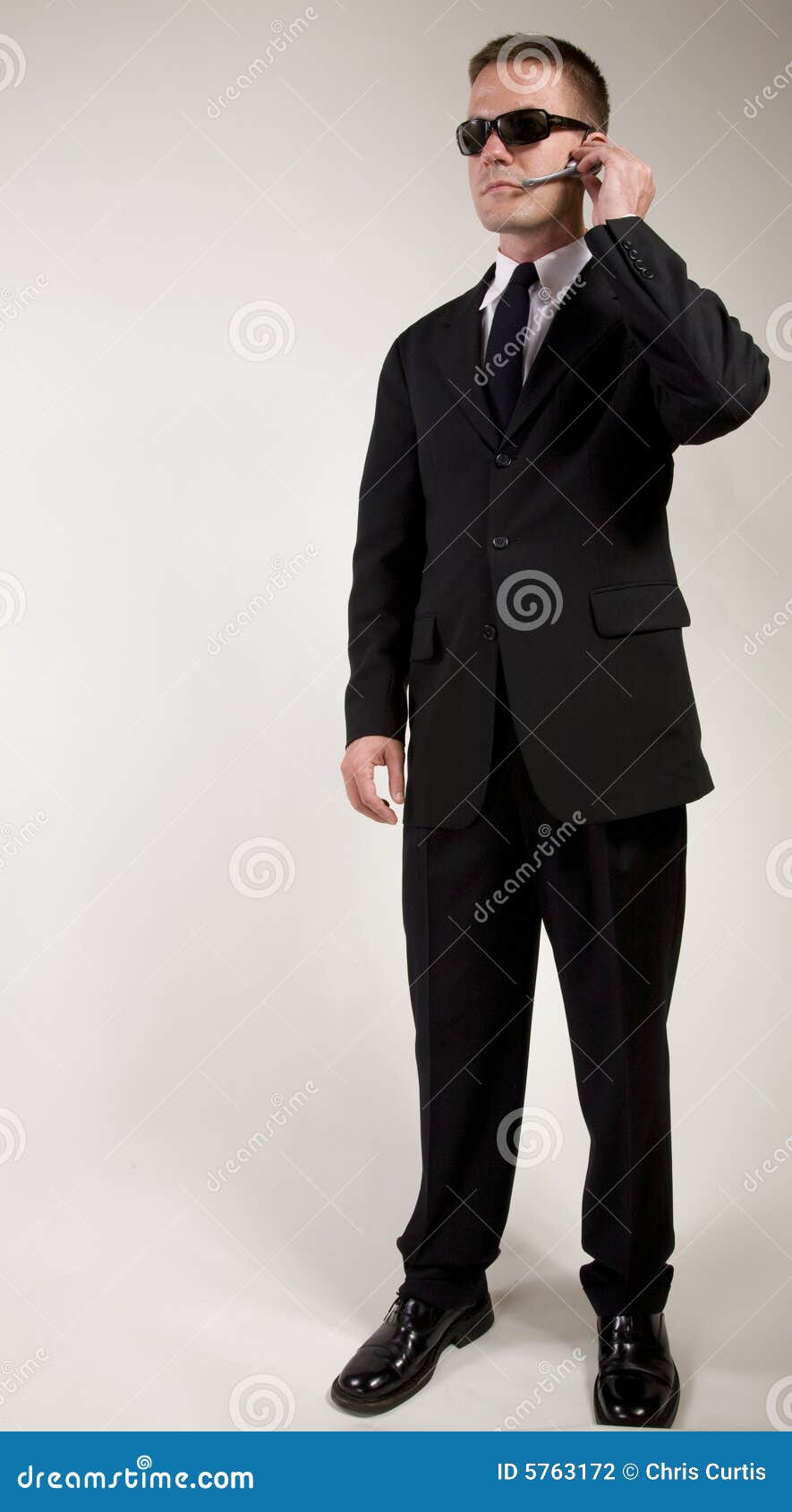 Secret Agent Listening stock photo. Image of fashionable - 5763172