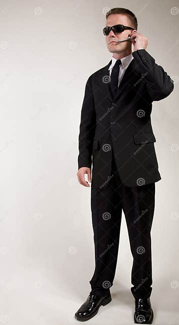 Secret Agent Listening stock photo. Image of fashionable - 5763172