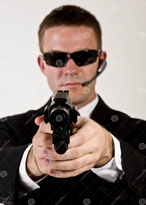 Secret Agent Pointing a Gun Stock Image - Image of fashion, police: 6371651