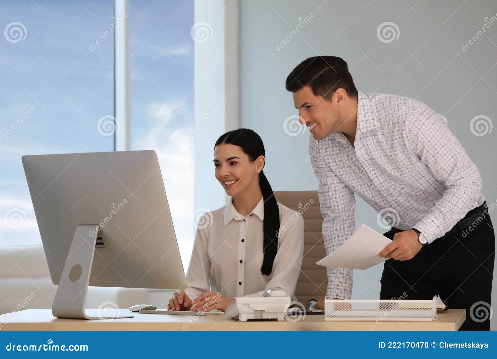 Secretary and Boss Working at Table in Office Stock Photo - Image of ...