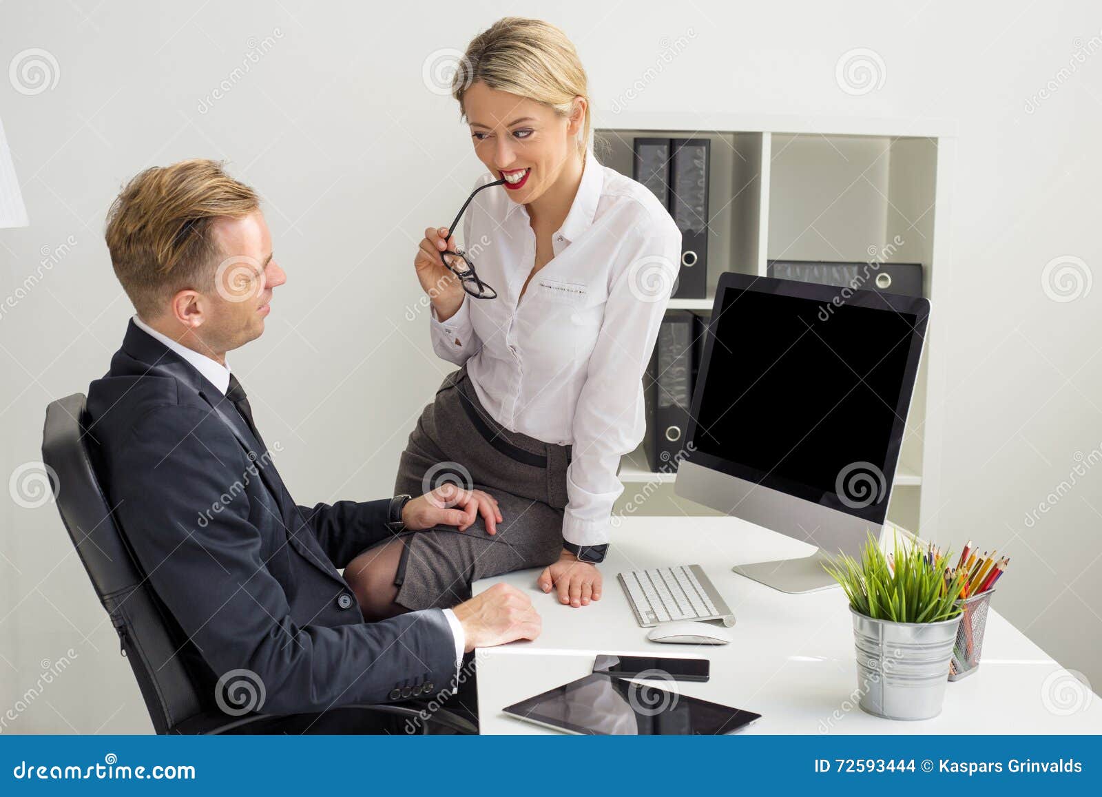 Secretary Flirting with Her Boss Stock Photo - Image of manager ...