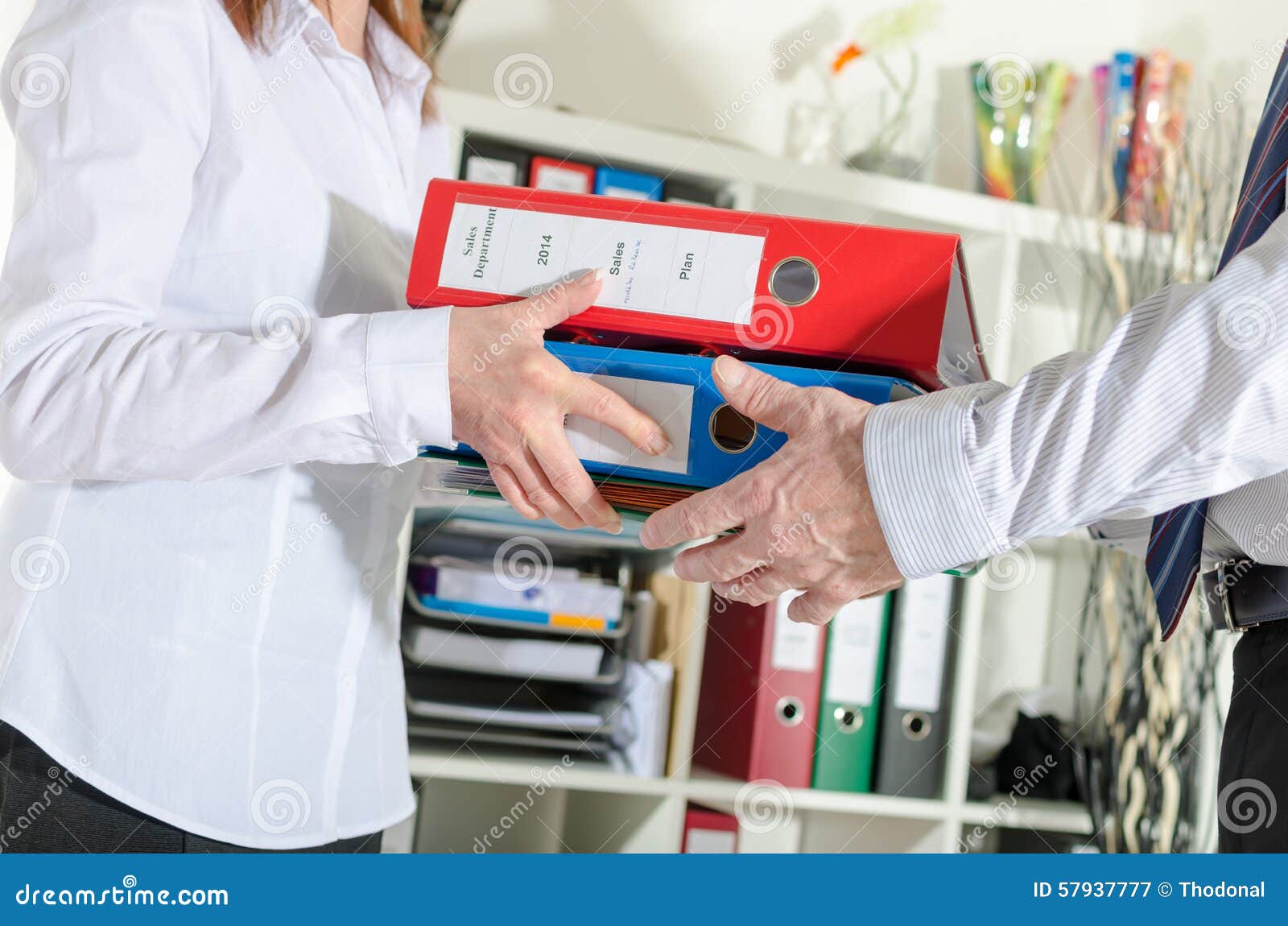 Secretary Giving Binders To Her Manager Stock Image - Image of business ...