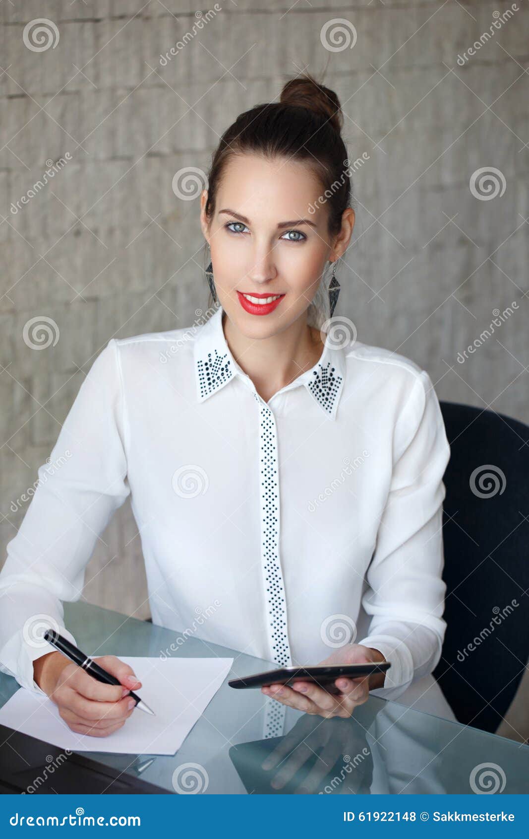 Secretary Holding Tablet and Write on Blank Paper Stock Photo - Image ...