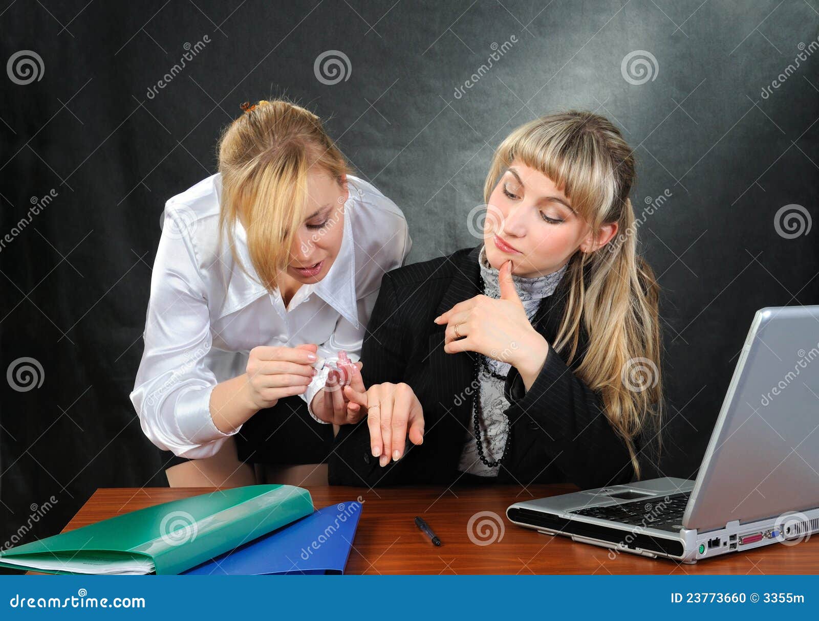 Secretary Makes a Manicure in the Workplace. Stock Photo - Image of ...