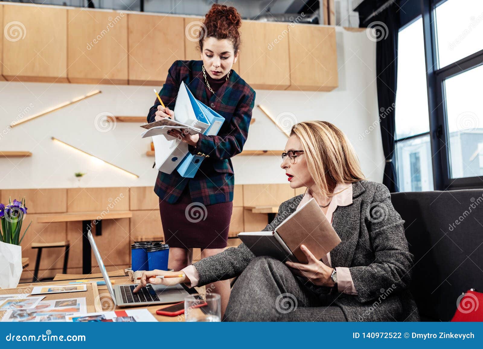 Secretary Making Notes while Listening To Instructions of Boss Stock ...