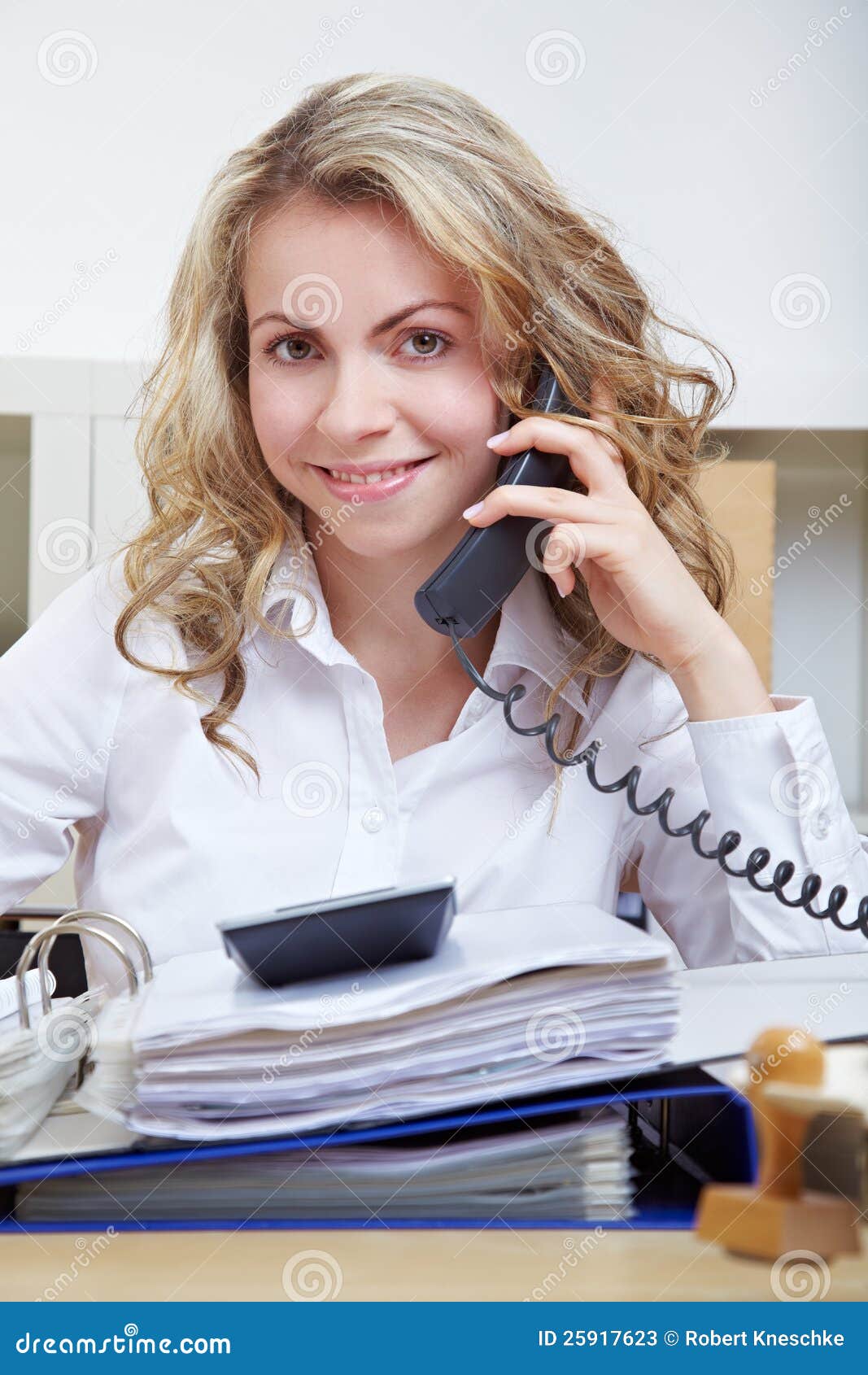 Secretary on the phone stock image. Image of internal - 25917623