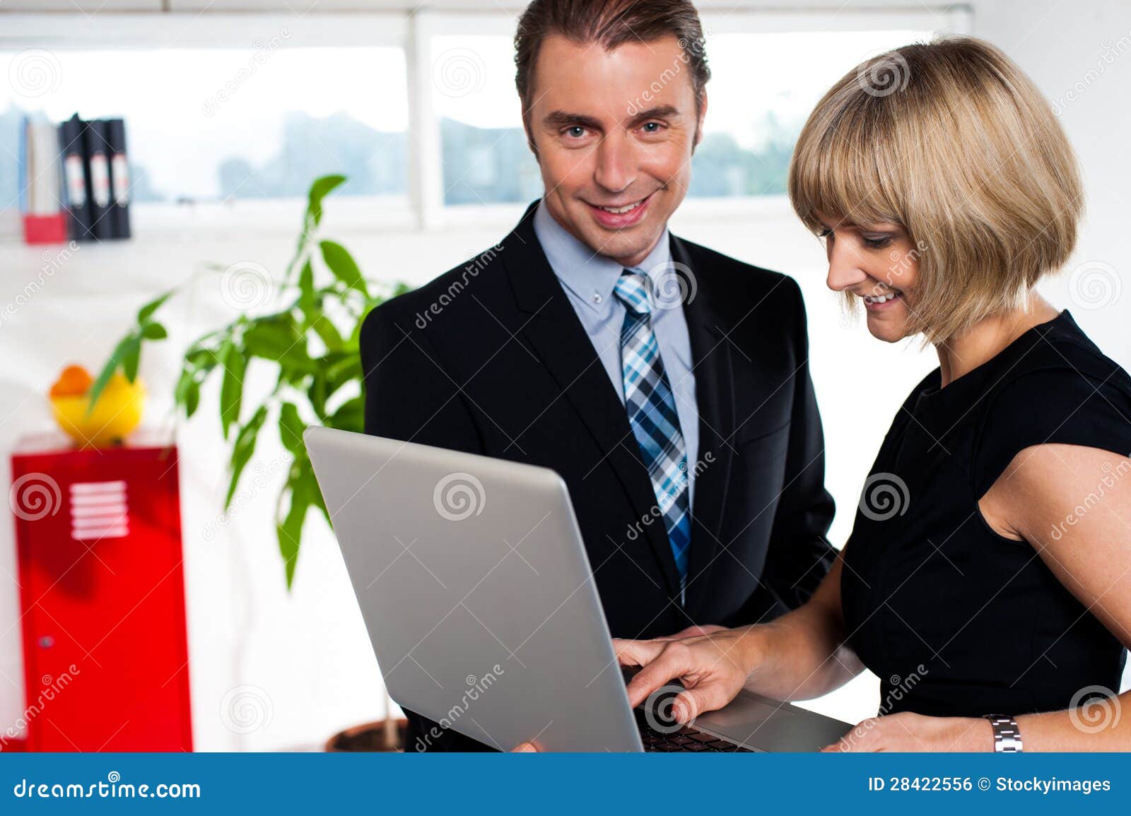 Secretary Showing Power Point Presentation To the Boss Stock Photo ...