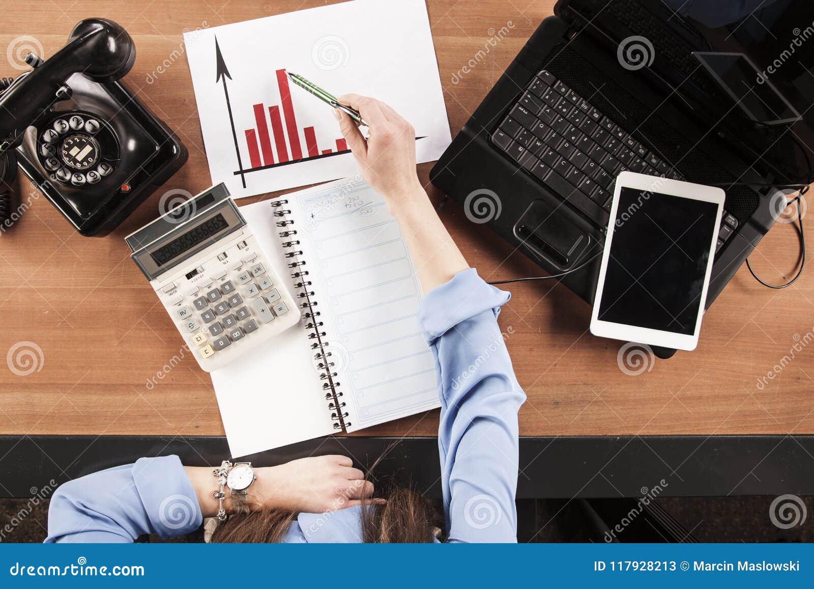 Secretary Shows the Increase on the Chart, Top View on the Desk Stock ...