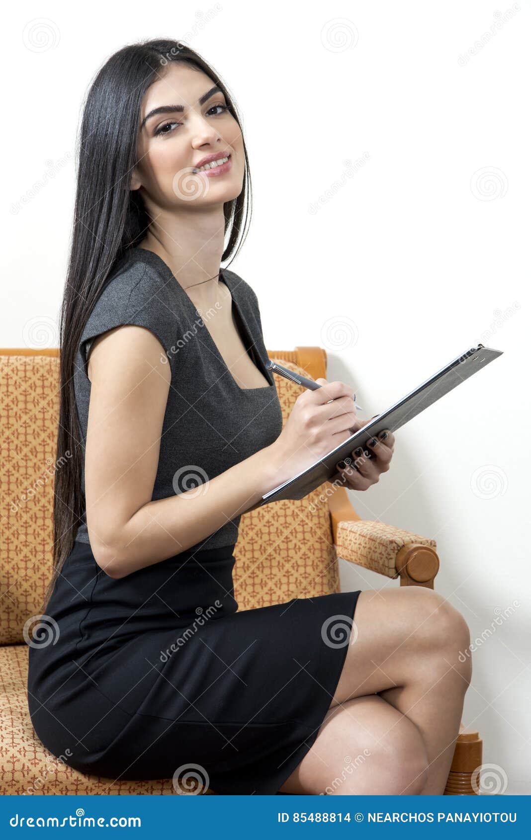 Secretary Smiling while Taking Notes. Stock Photo - Image of woman ...