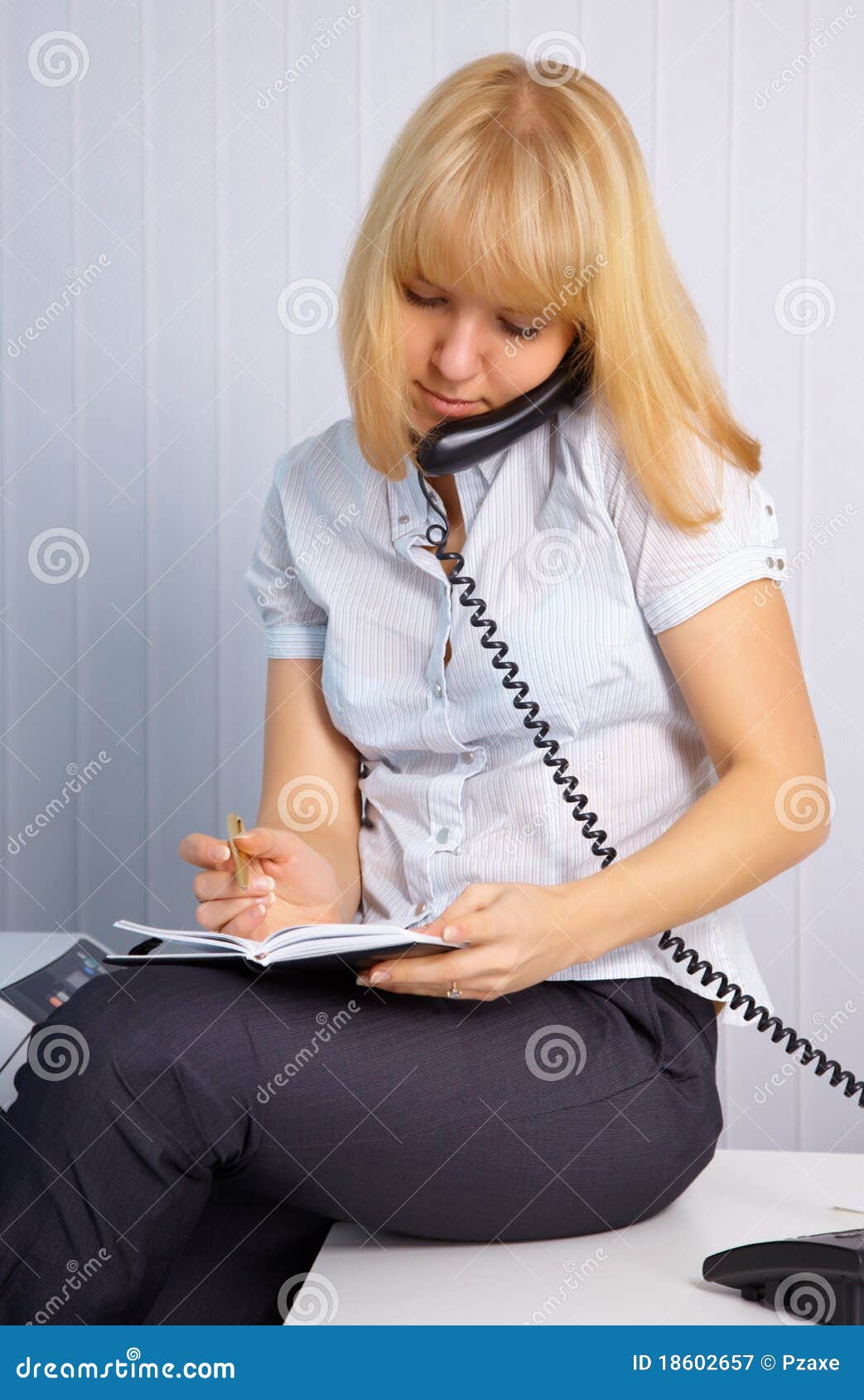 Secretary Takes Calls while Sitting on Table Stock Image - Image of ...